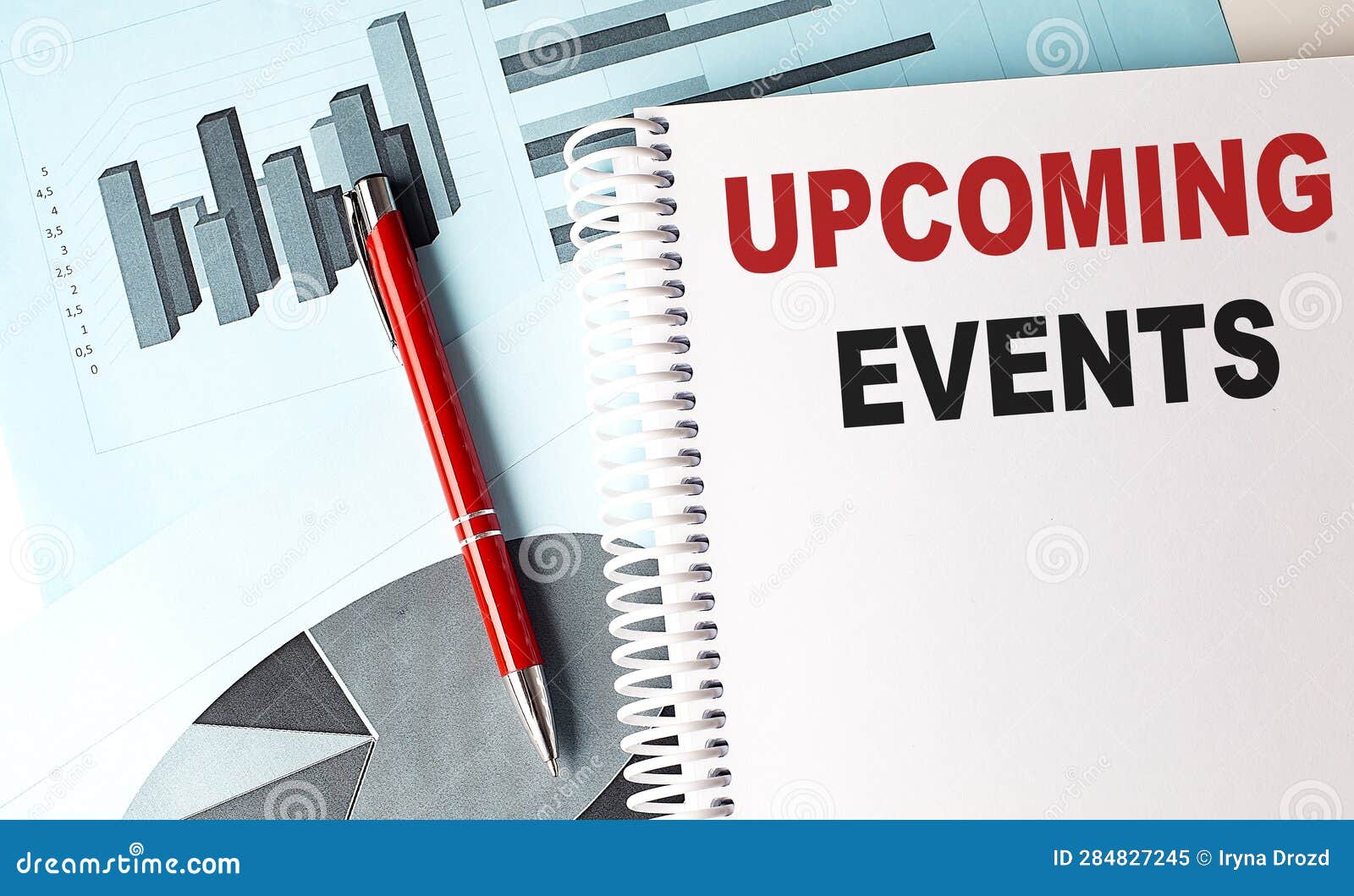UPCOMING EVENTS Text on a Notebook with Pen on a Chart Background Stock ...