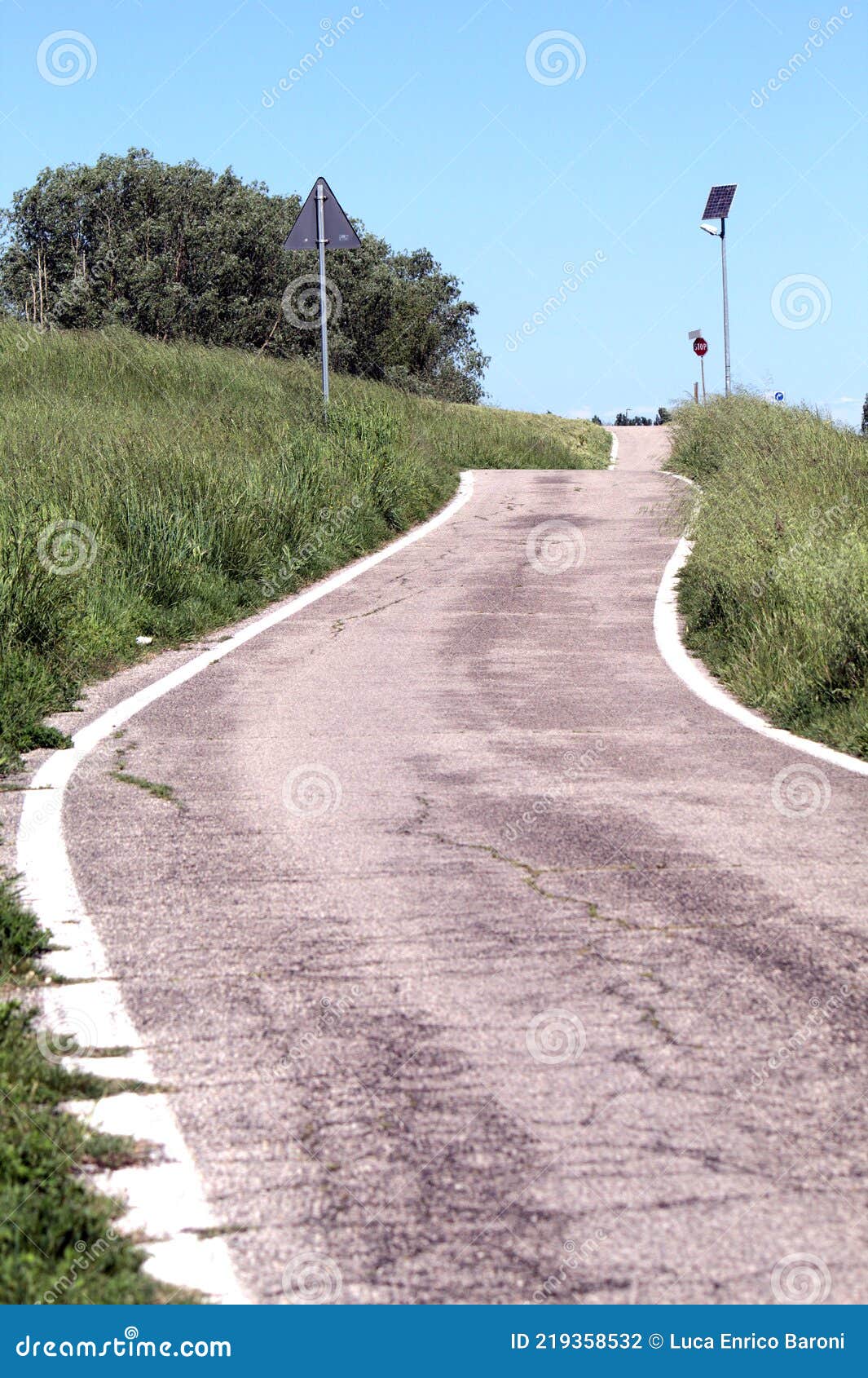 An uphill road stock photo. Image of view, sunny, outdoor - 219358532