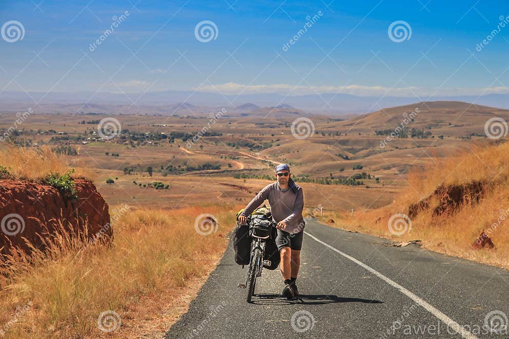 Uphill struggle stock image. Image of africa, cycling - 38674271