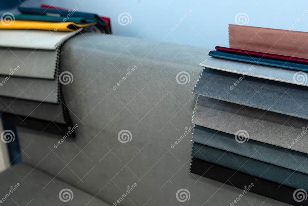 Upholstery Fabric Samples on Grey Sofa, Concept of Renovation Stock ...