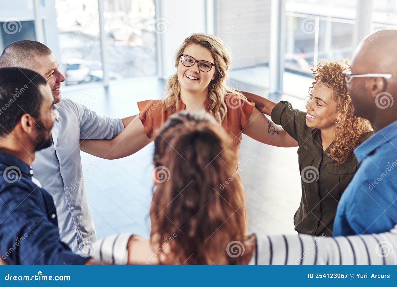 We Uplift and Support Each Other. a Group of People Standing in a ...