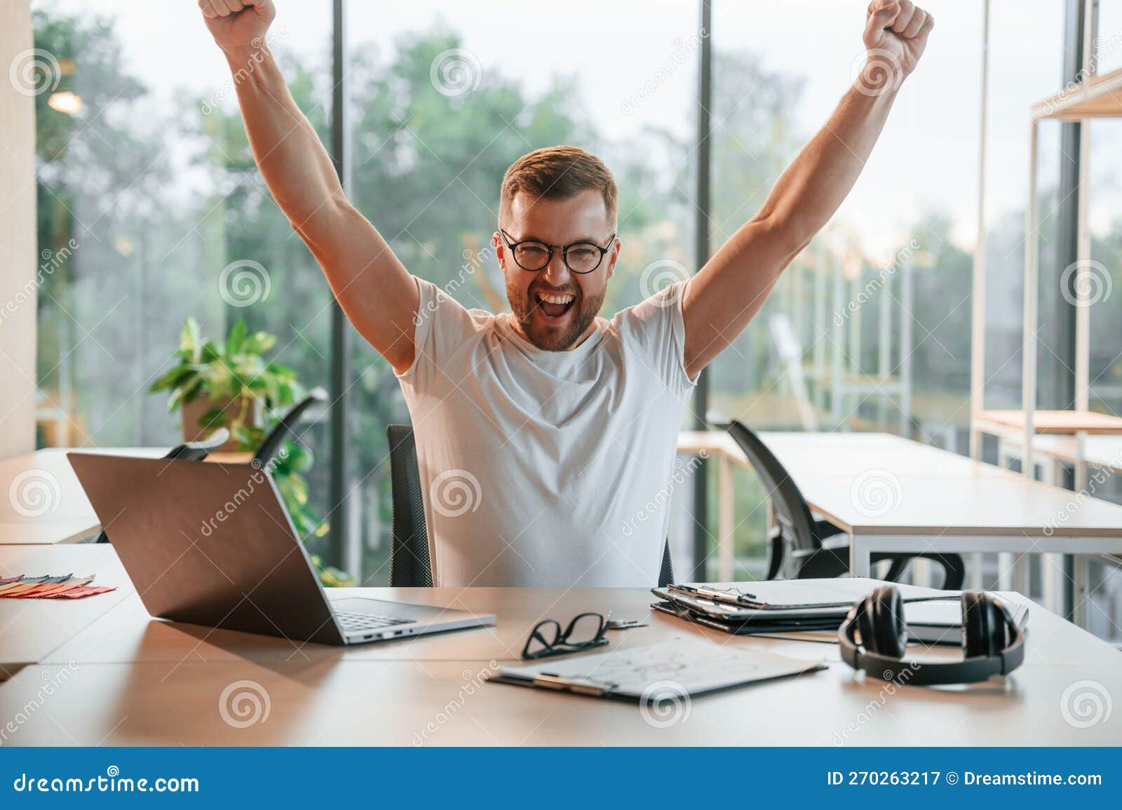 Uplifting Mood. Man in Formal Clothes is Working in the Modern Office ...