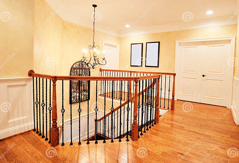 Upper Hallway and Staircase in Upscale Home Stock Photo - Image of ...