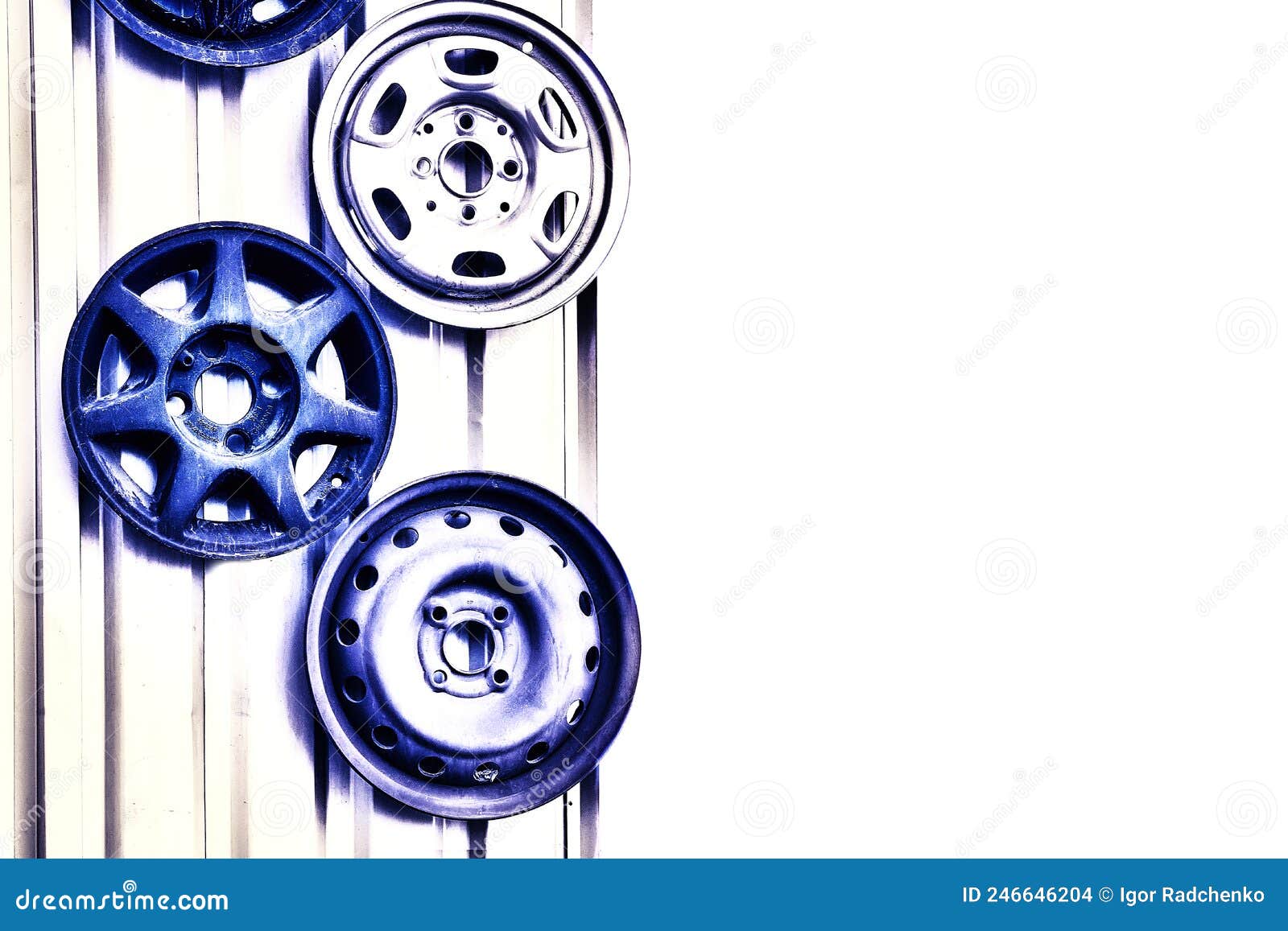 Three Metal Car Rims Hanging on the Wall with Space for Text Stock ...