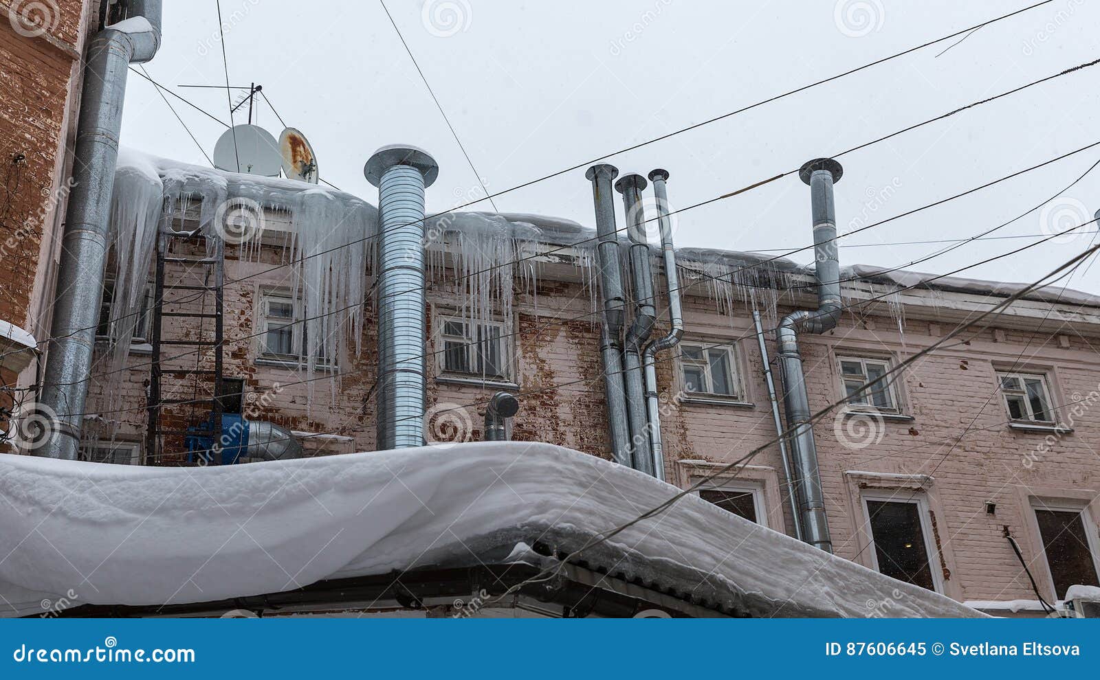 Upper Part of the Old Brick Building with Chrome Chimneys and Ha Stock ...