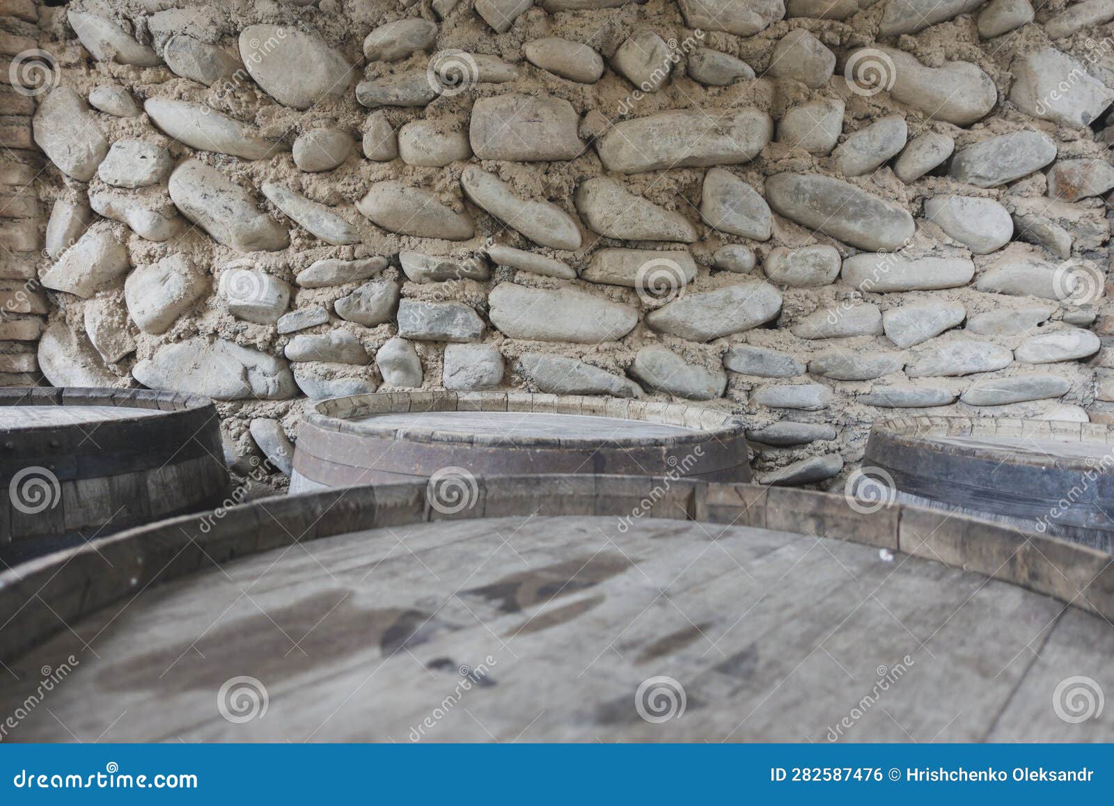 The Upper Surface of the Wooden Barrel on the Background of a Stone ...