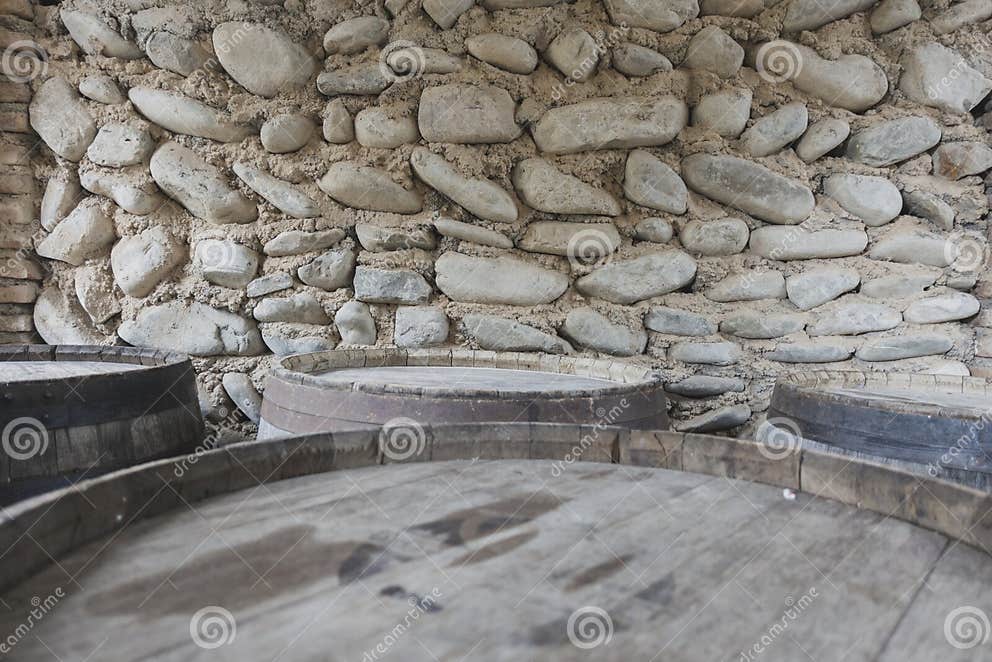 The Upper Surface of the Wooden Barrel on the Background of a Stone ...