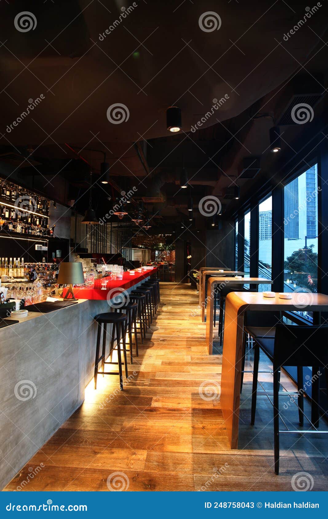 An Upscale Bar Lounge with Wooden Table and Floor Stock Image - Image ...