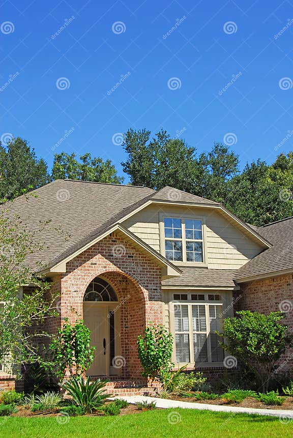 Upscale Brick Home stock image. Image of gable, home, pathway - 3312009