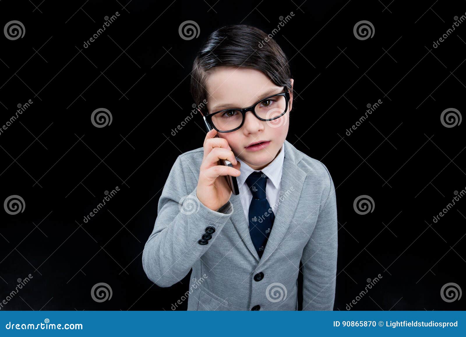 Upset boy using smartphone stock photo. Image of working - 90865870