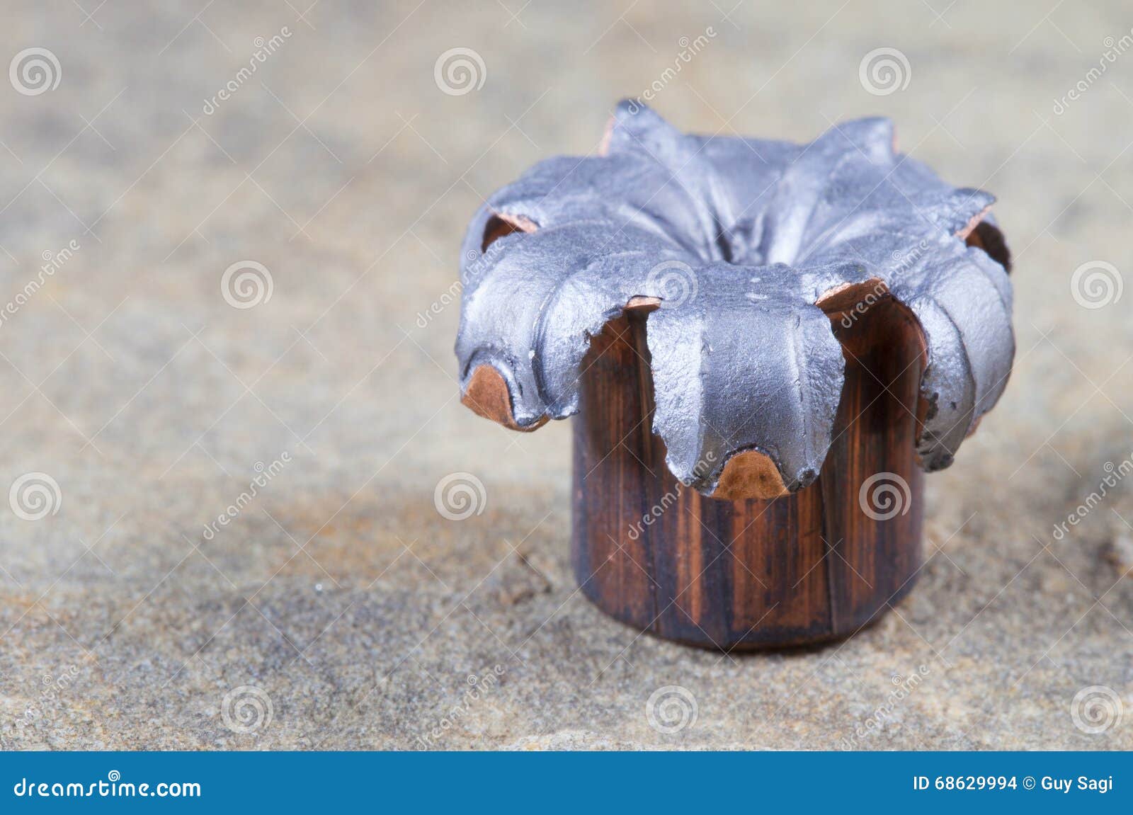 Upset bullet stock photo. Image of metal, stone, rock - 68629994