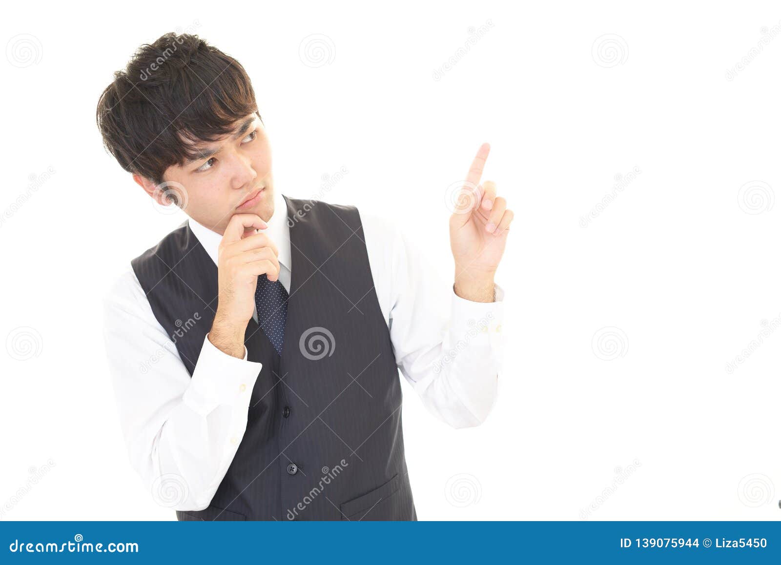 Uneasy Asian businessman stock photo. Image of corporate - 139075944