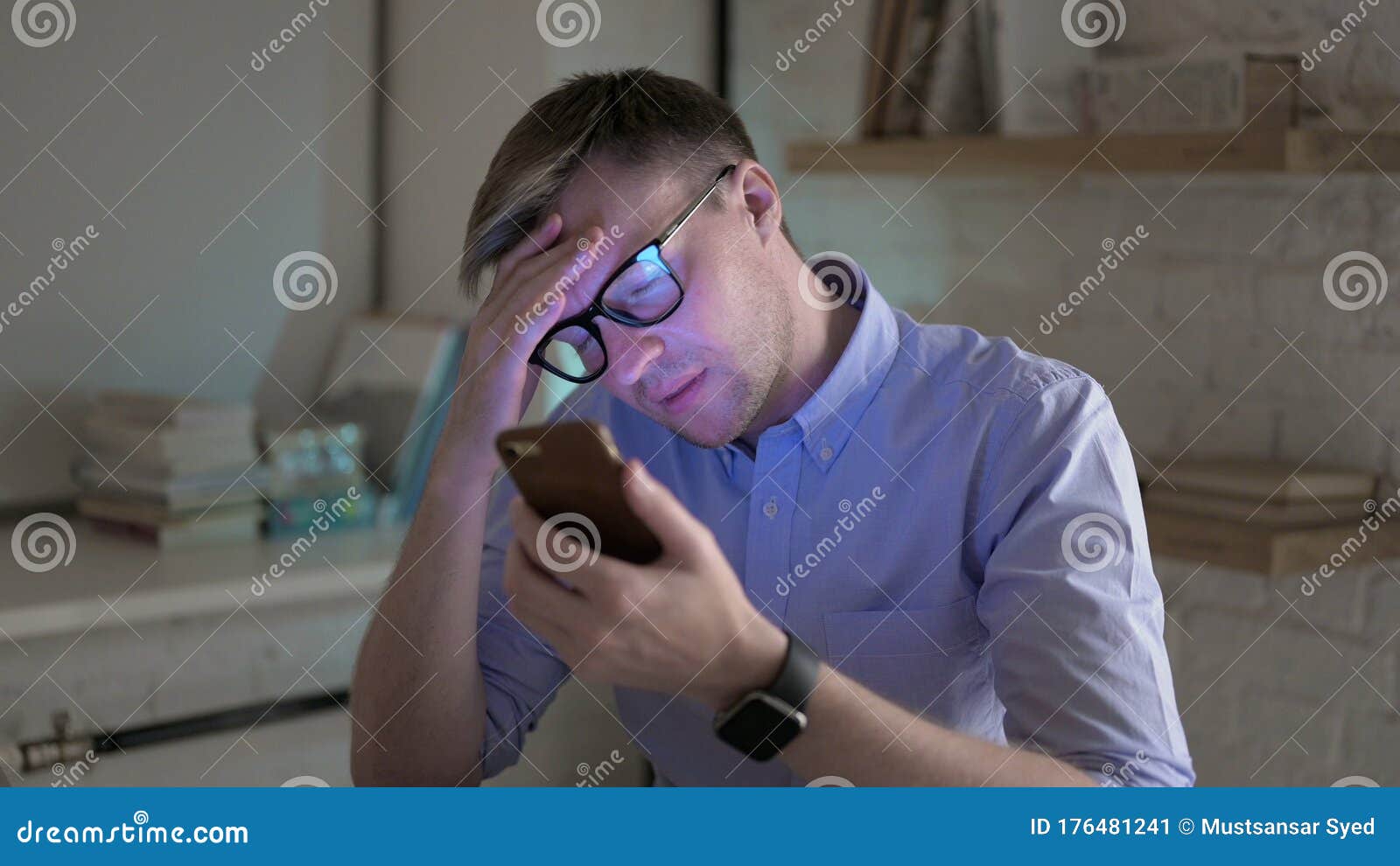 Upset Businessman with Headache Using Smartphone Stock Image - Image of ...