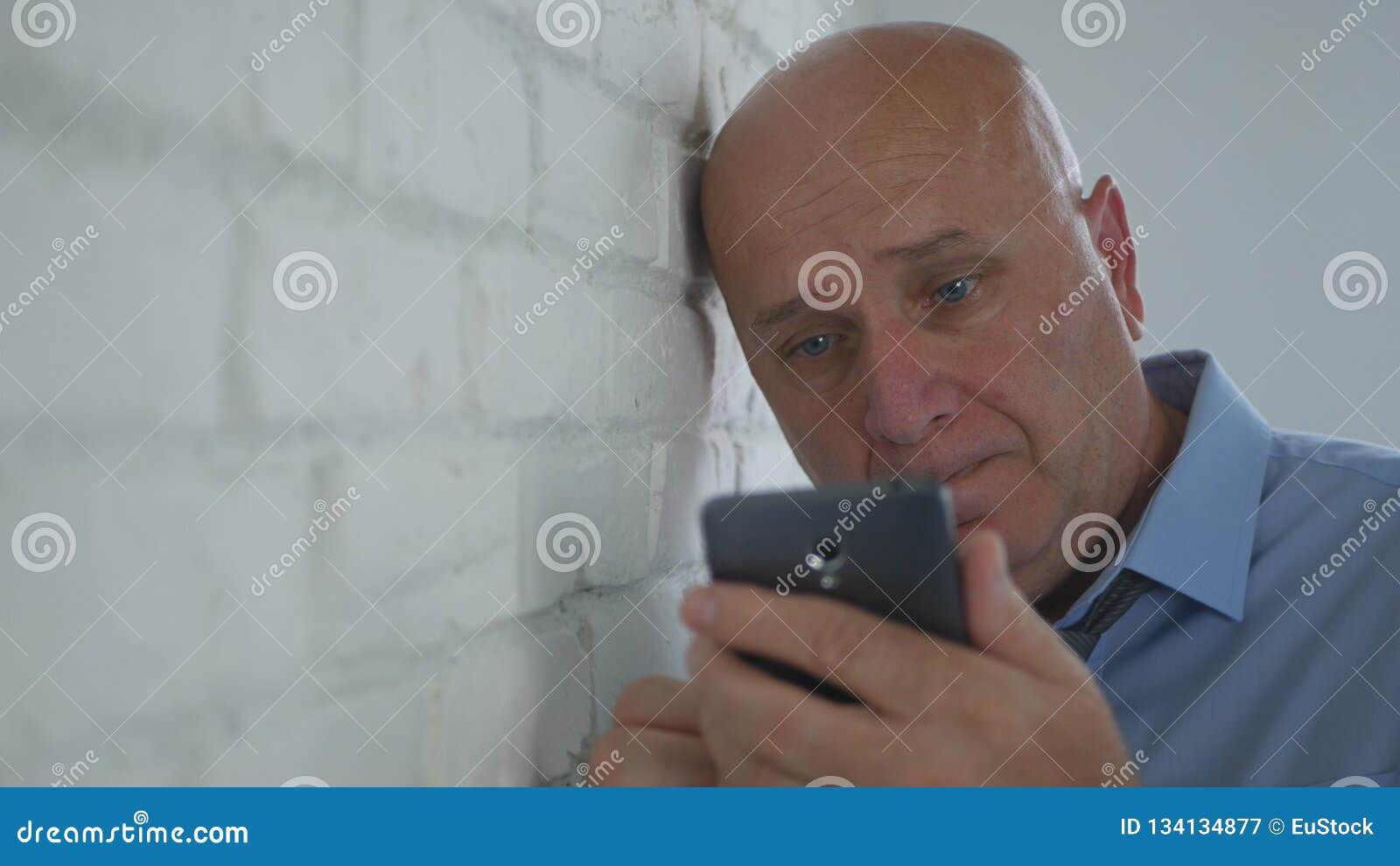 Upset Businessman Looking Disappointed on Cell Phone Text Stock Image ...