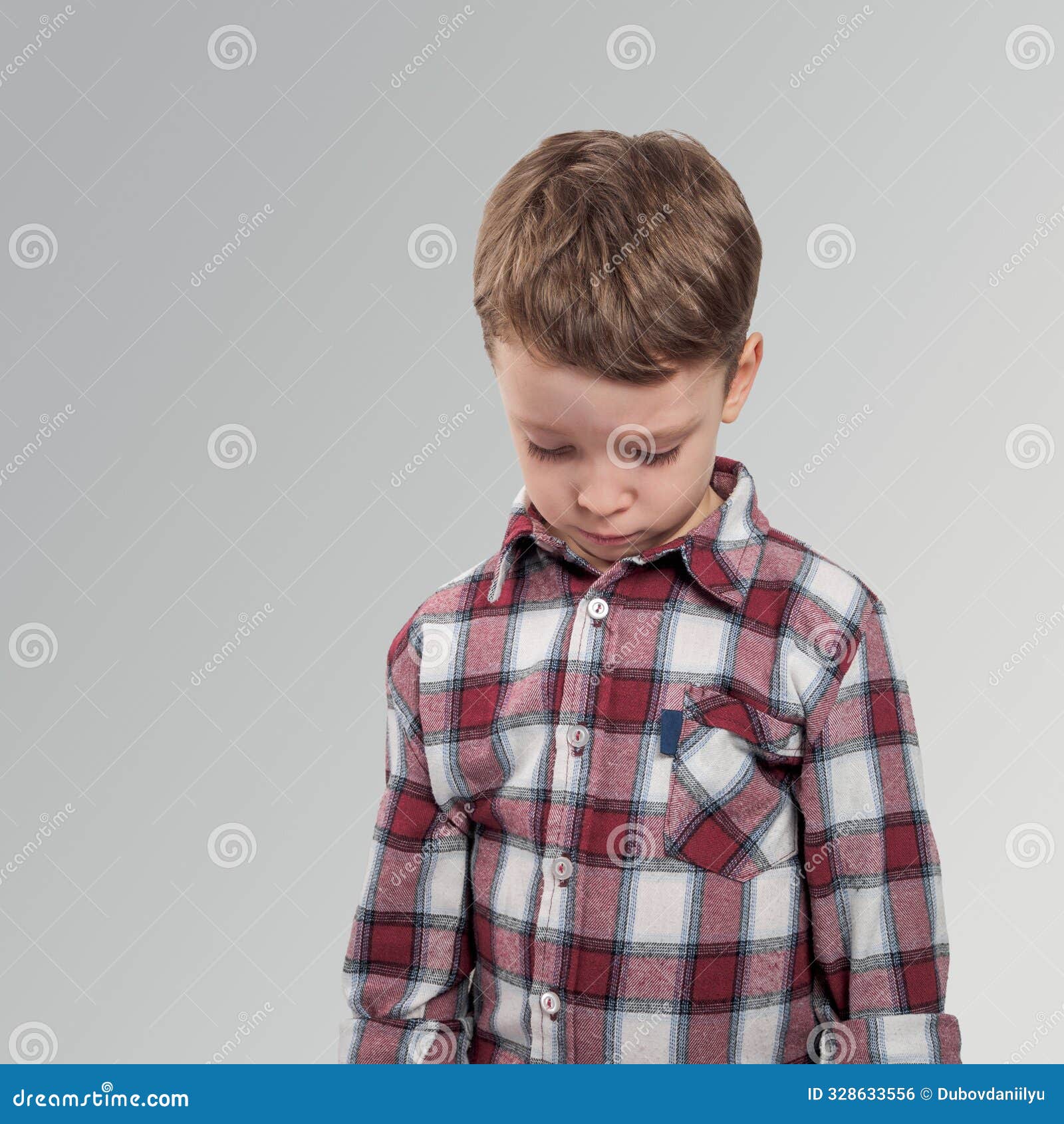 An Upset Child with a Sad Expression: Reflecting Emotions and ...