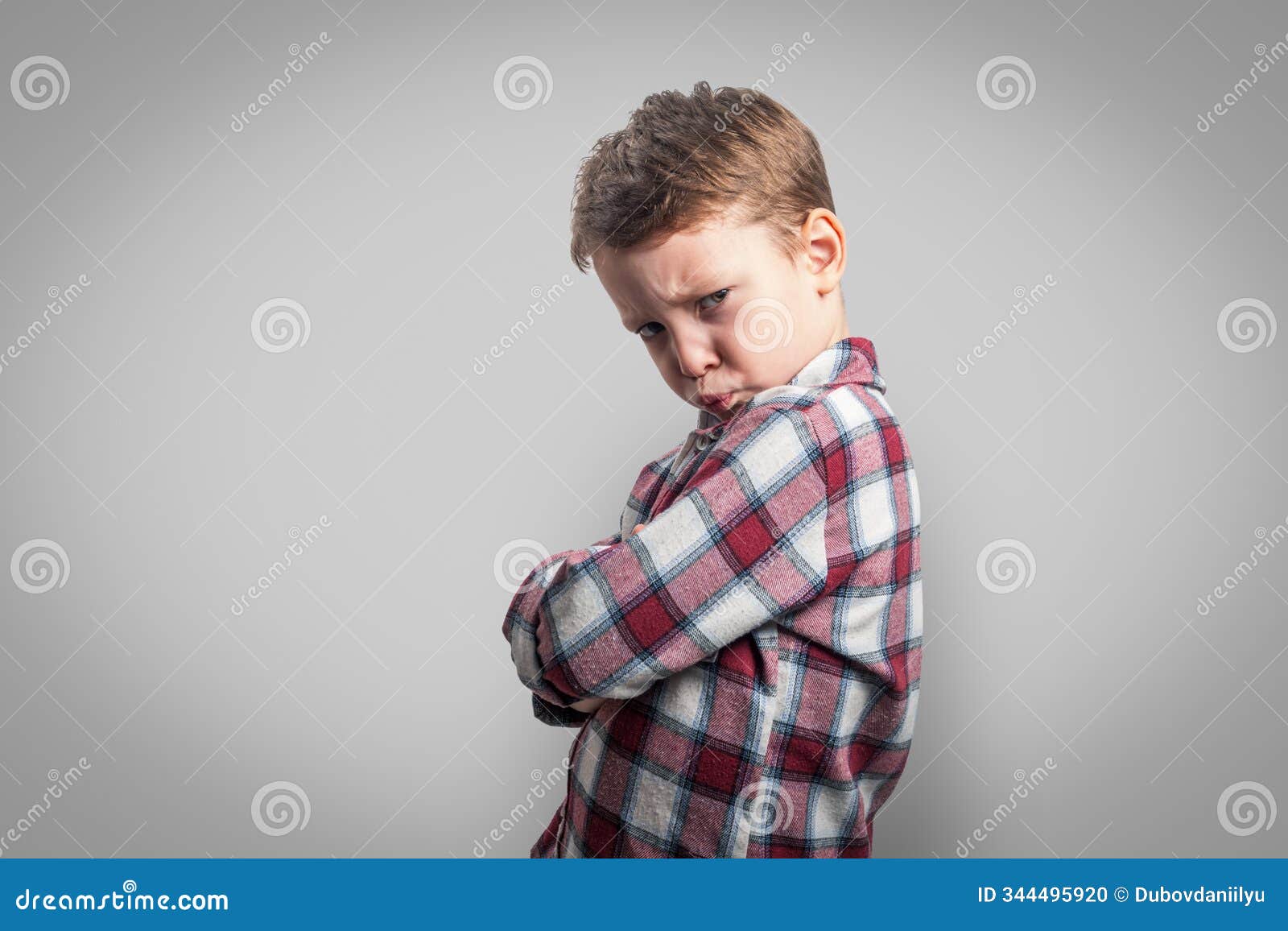 An Upset Child with a Sad Expression: Reflecting Emotions and ...