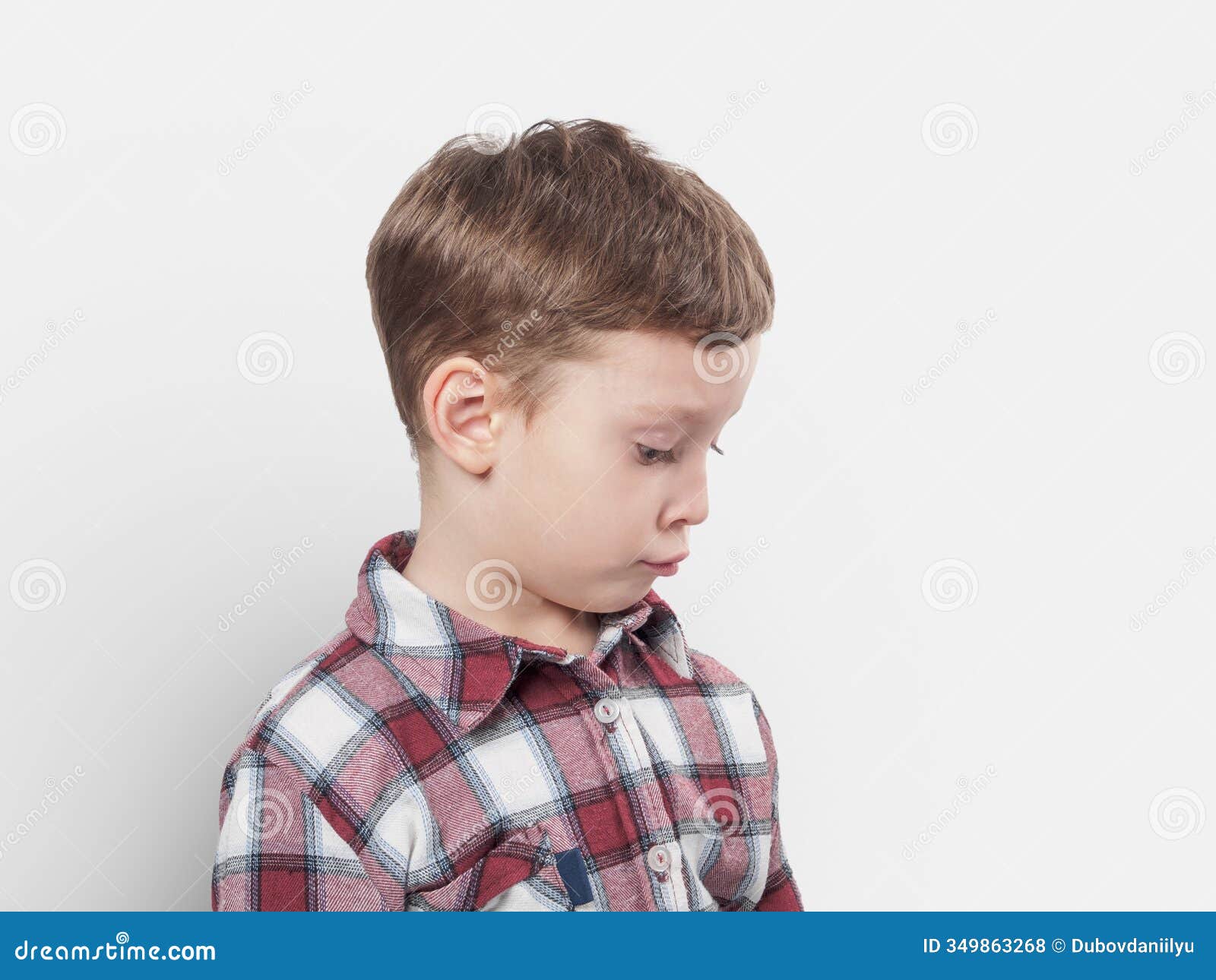 An Upset Child with a Sad Expression: Reflecting Emotions and ...