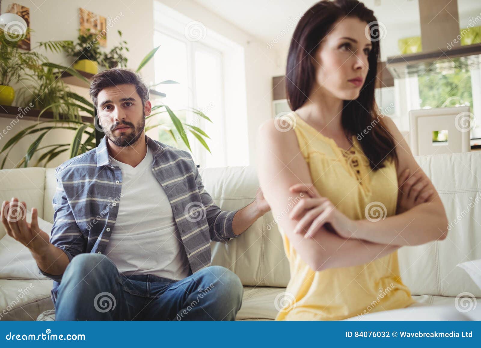 Upset Couple Arguing with Each Other on Sofa Stock Photo - Image of ...
