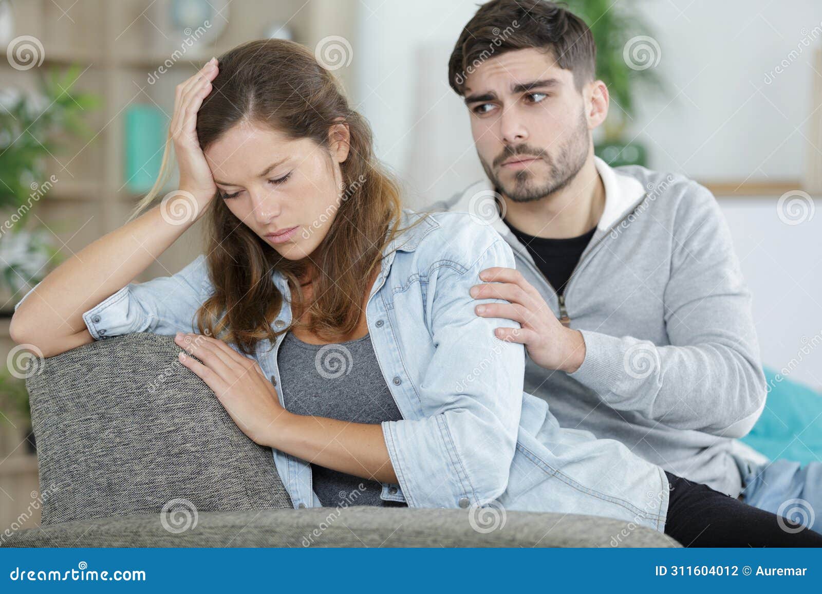 Upset Couple Sitting after Arguing on Couch Stock Photo - Image of ...
