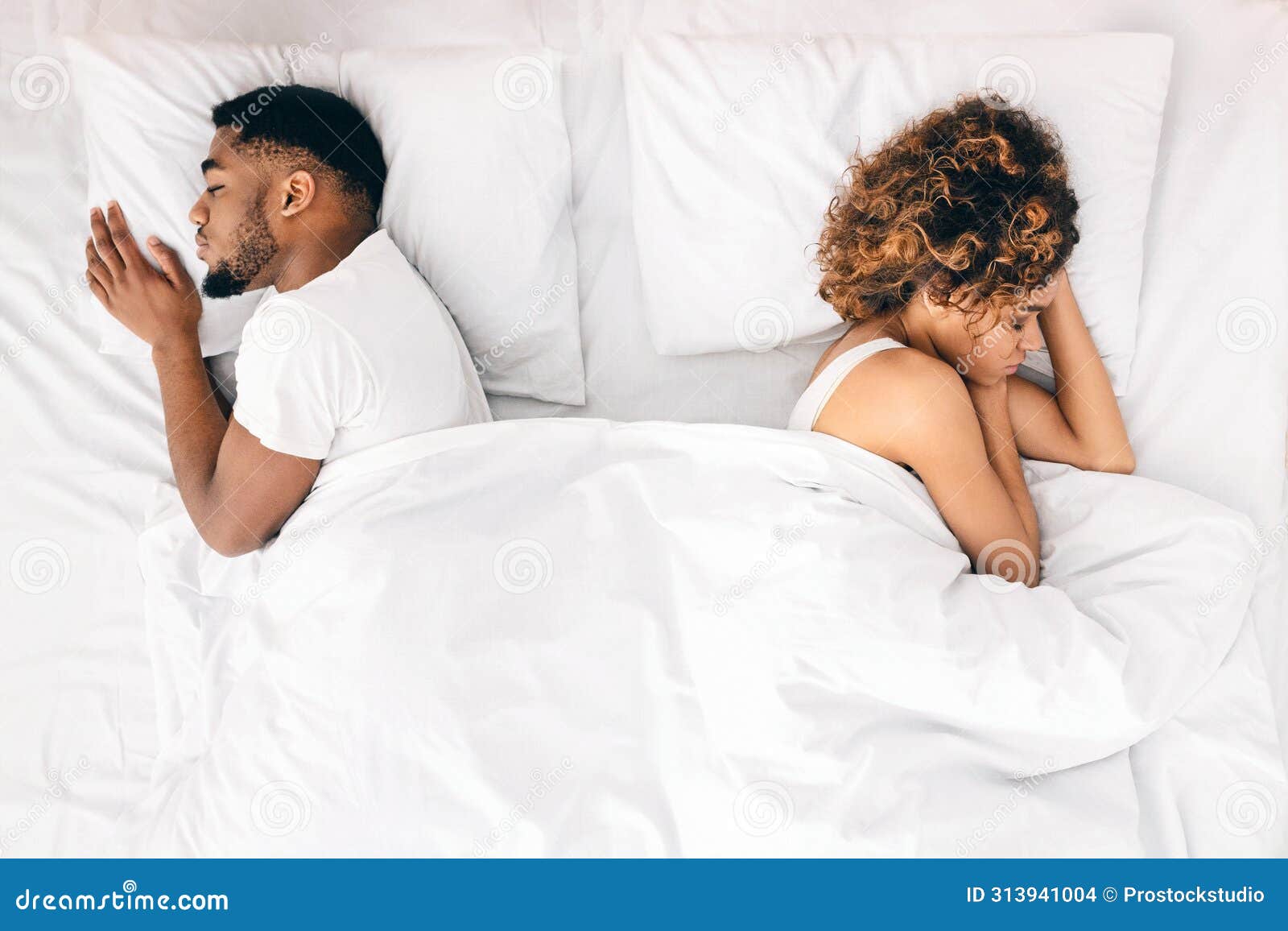 Upset Couple Sleeping Separately on Their Bed Stock Photo - Image of ...