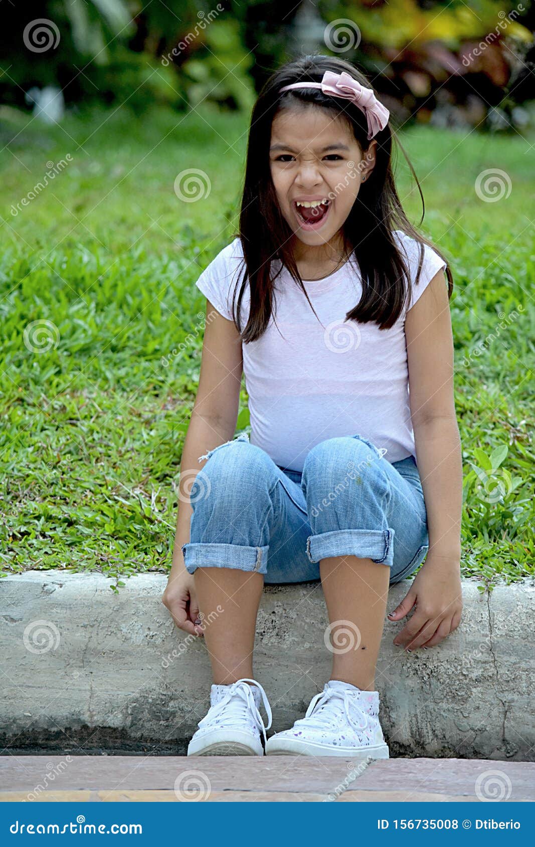 An Upset Cute Asian Juvenile Stock Photo - Image of asian, cute: 156735008