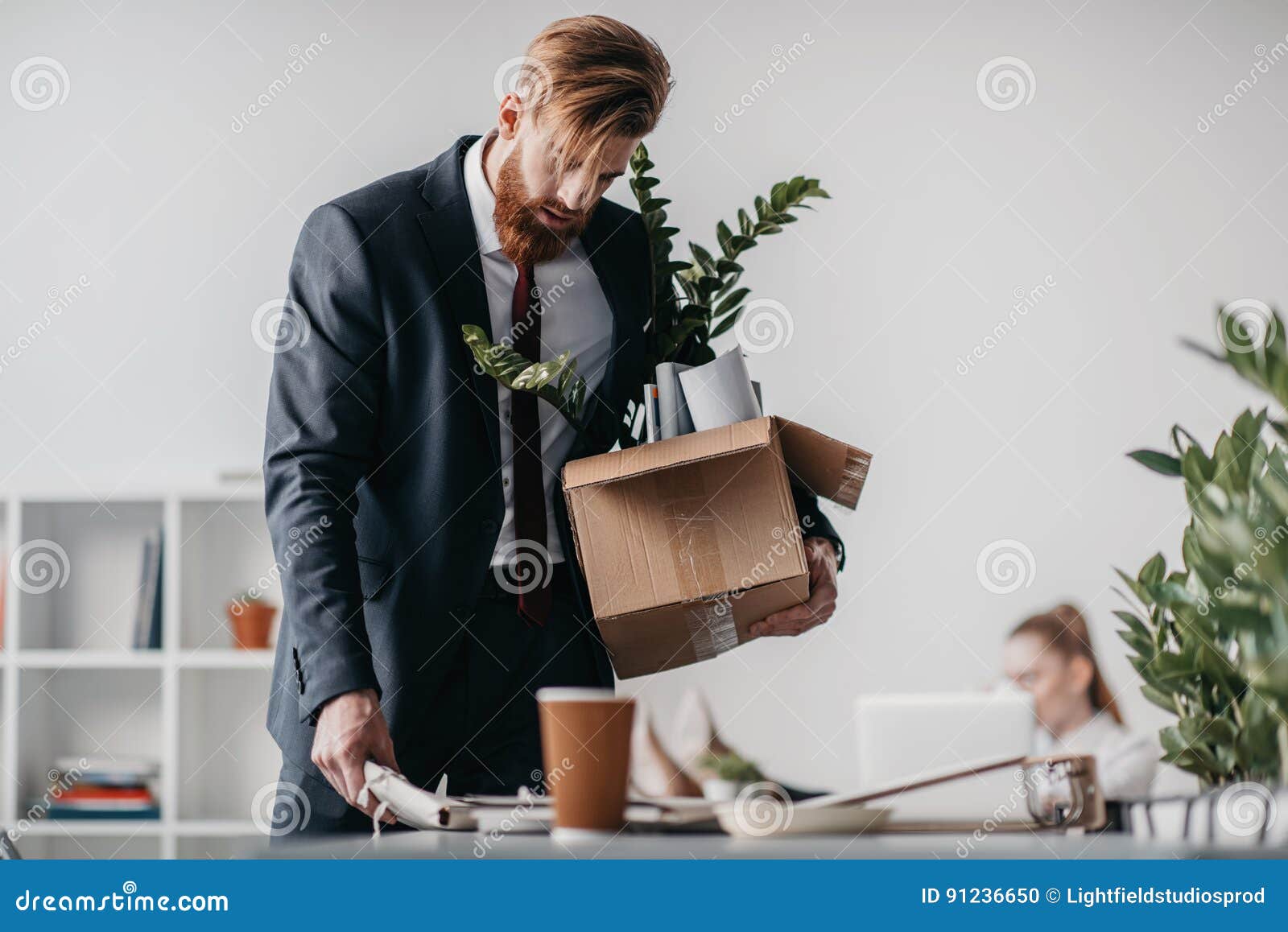 Upset Fired Businessman with Cardboard Box in Office Stock Photo ...