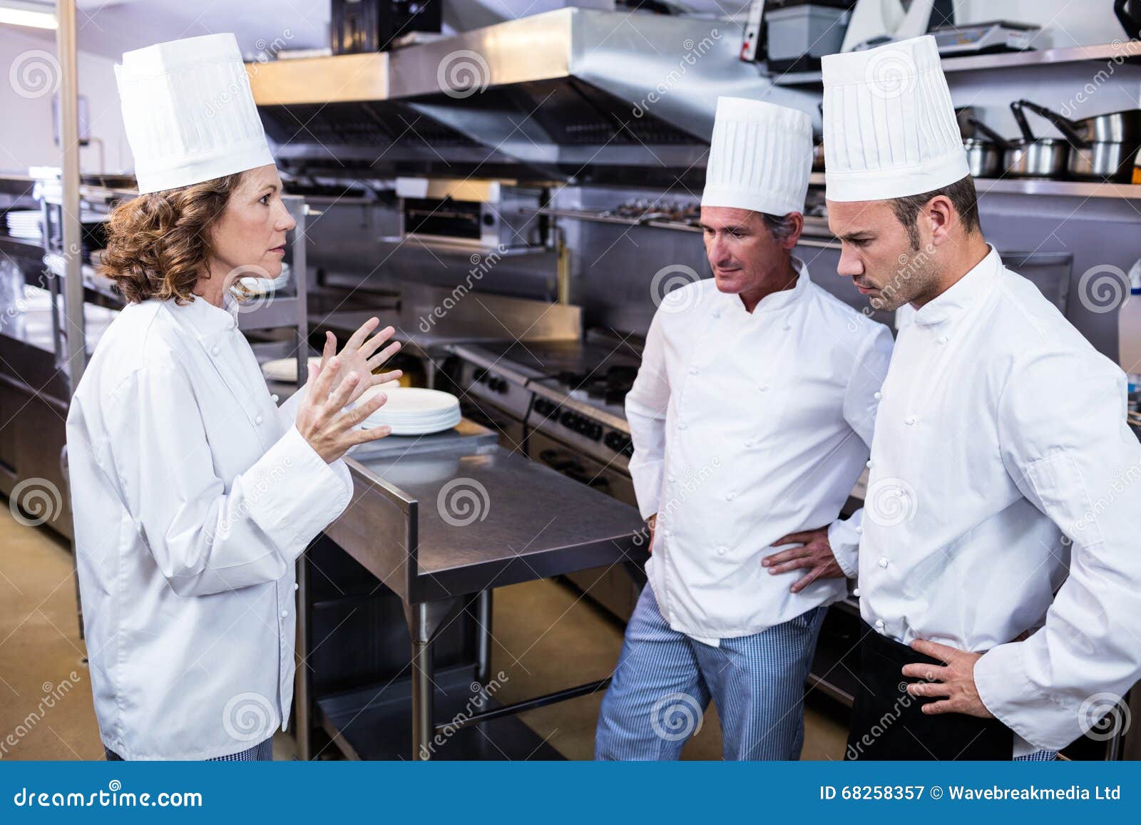 Upset Head Chef Talking To Her Team Stock Image - Image of cook ...