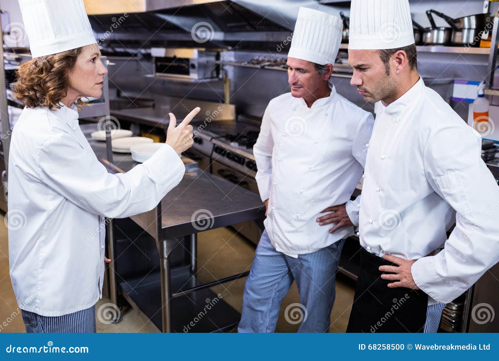 Upset Head Chef Talking To Her Team Stock Photo - Image of irritated ...
