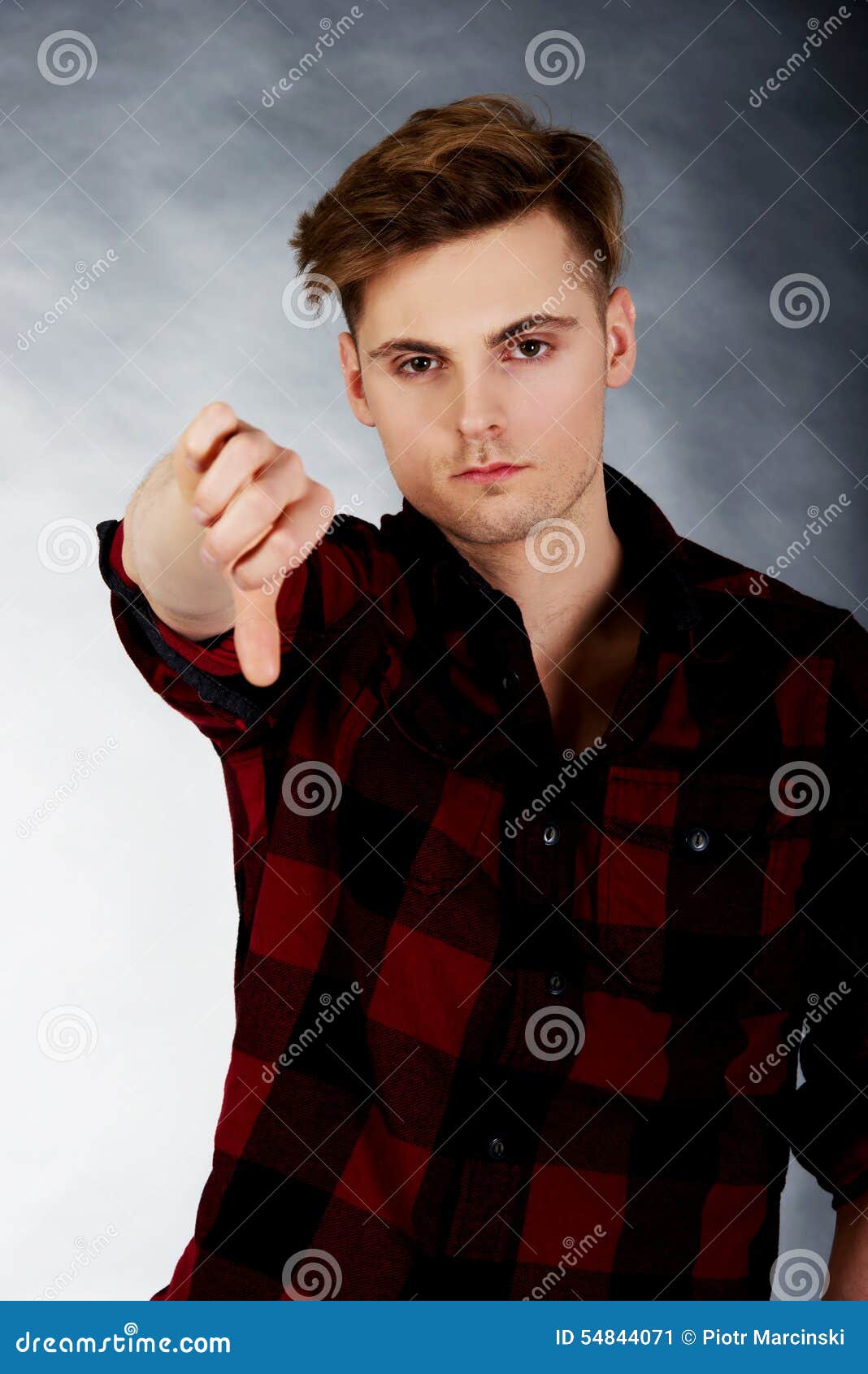 Upset Man with Thumbs Down. Stock Image - Image of beautiful, rise ...