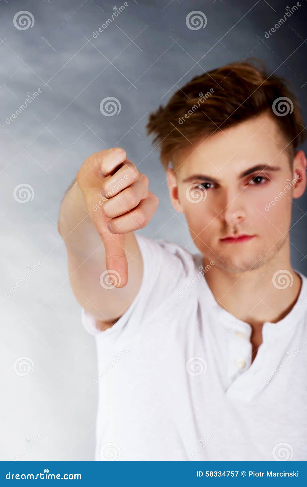 Upset Man with Thumbs Down. Stock Image - Image of shirt, male: 58334757