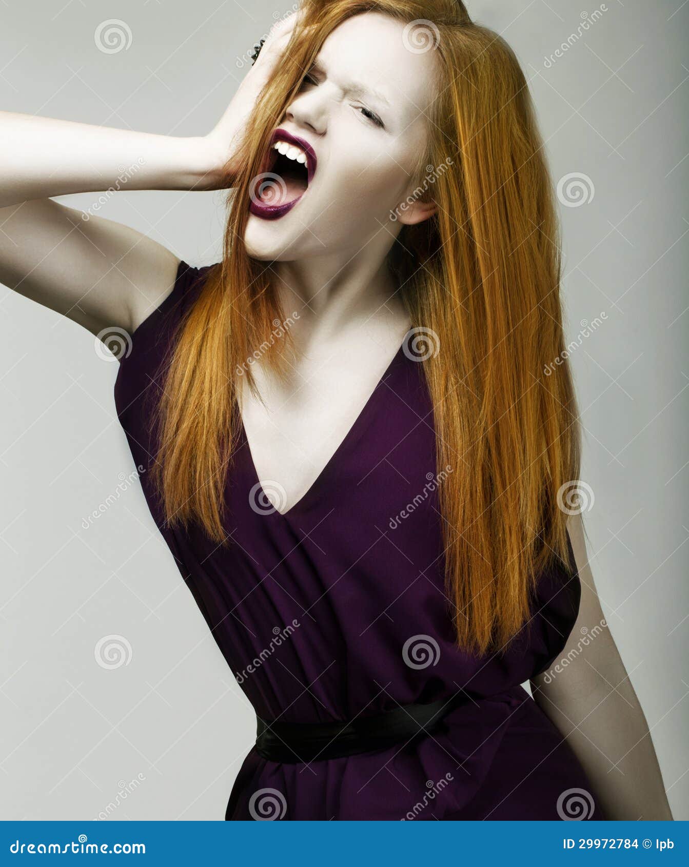 Rage. Aggression. Redhead Furious Ecstatic Woman in Despair Screaming ...