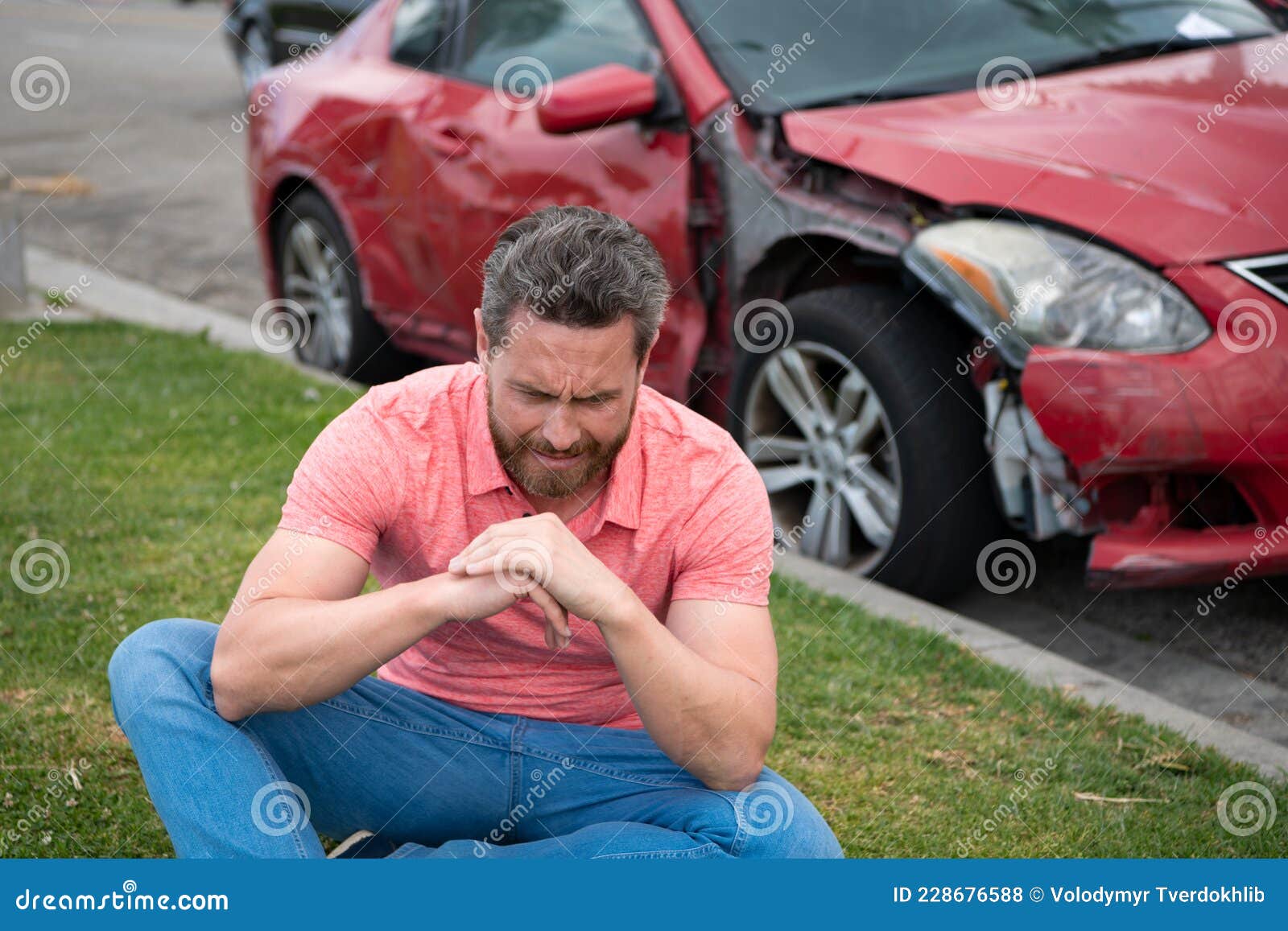Upset Sad Driver Sitting on the Road Next To Broken Car. Stock Photo ...
