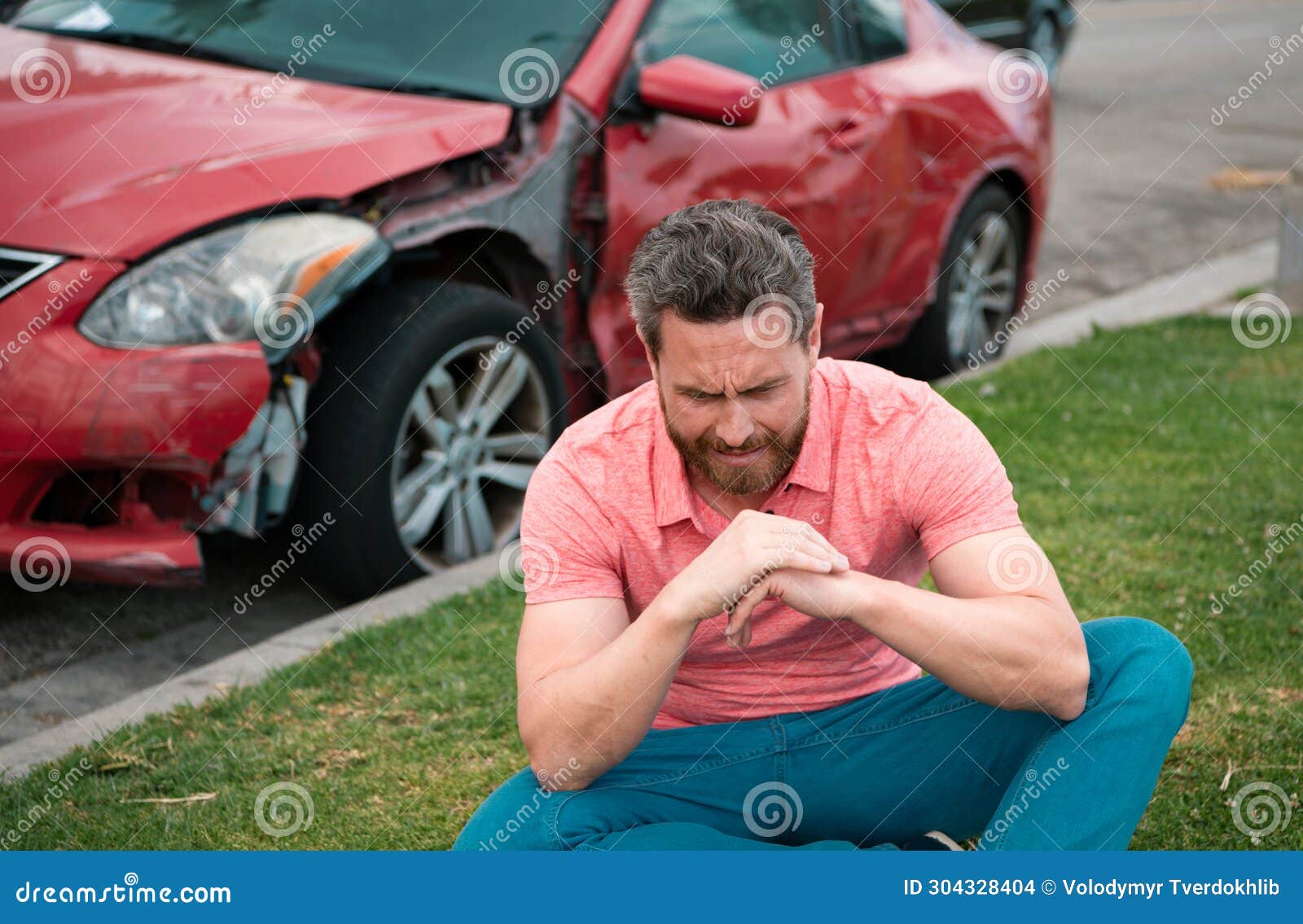 Upset Sad Driver Sitting on the Road Next To Broken Car. Stock Photo ...