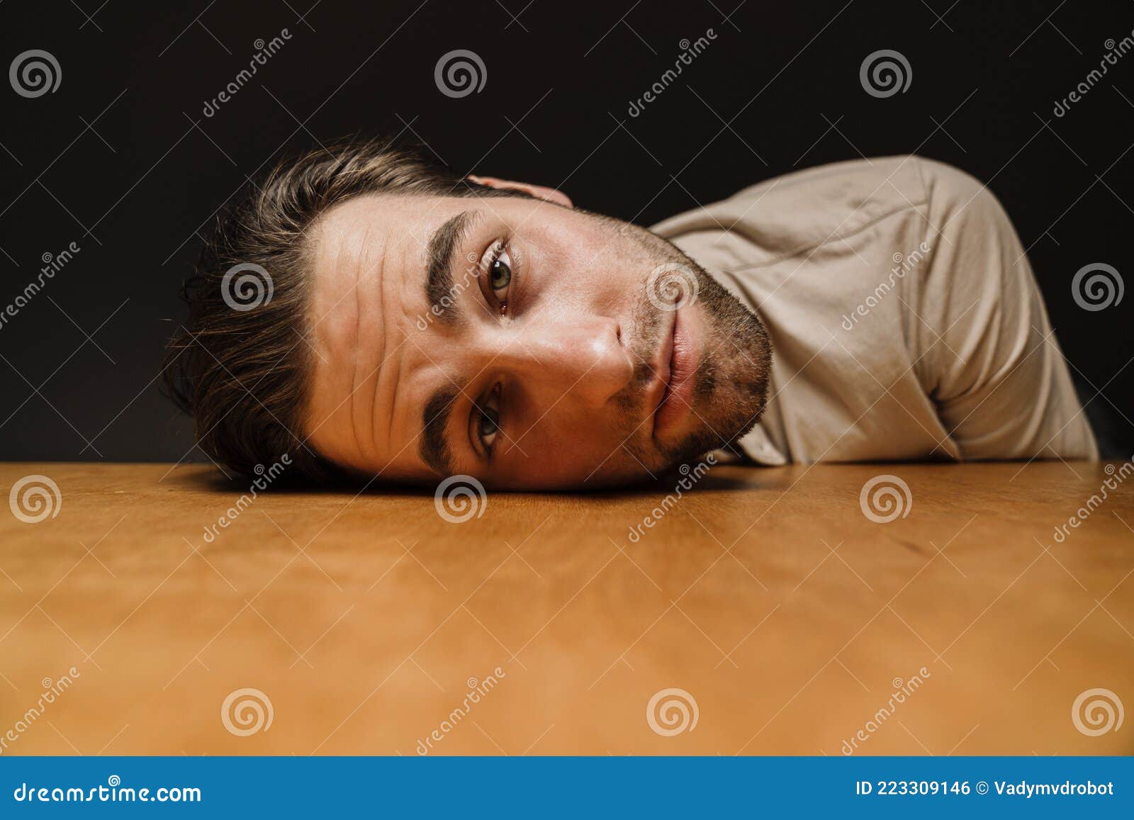 Upset Sad Man Laying His Head on a Table Indoors Stock Photo - Image of ...
