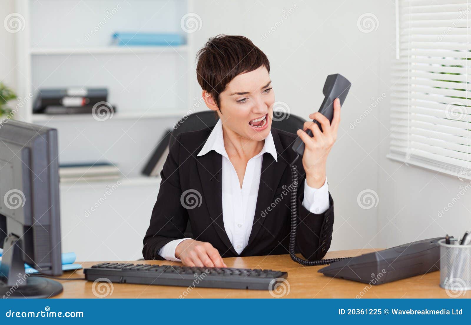Upset secretary calling stock image. Image of communication - 20361225