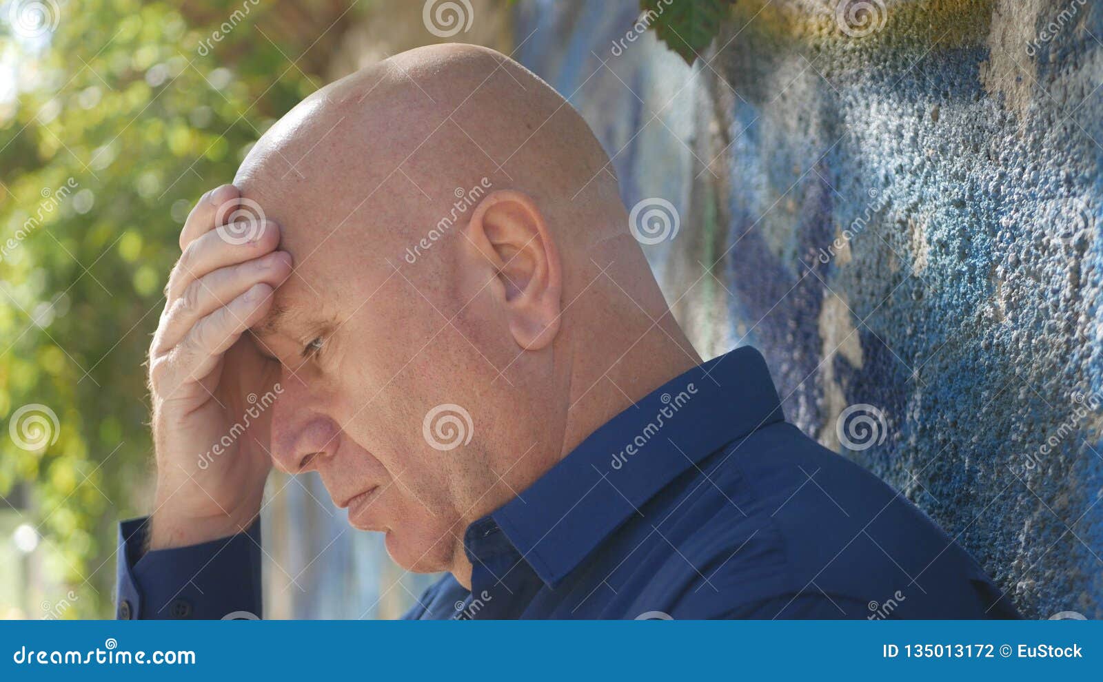 Upset and Suffering Person Staying Near a Painted Wall Stock Photo ...
