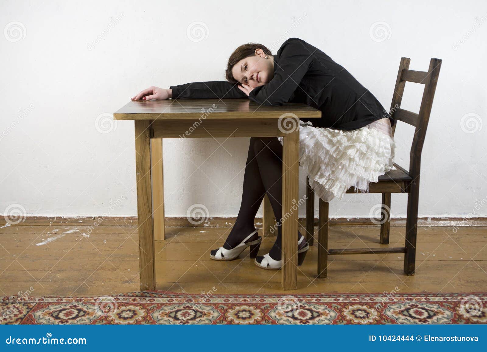 Upset Woman Lying on Table. Stock Photo - Image of tired, woman: 10424444