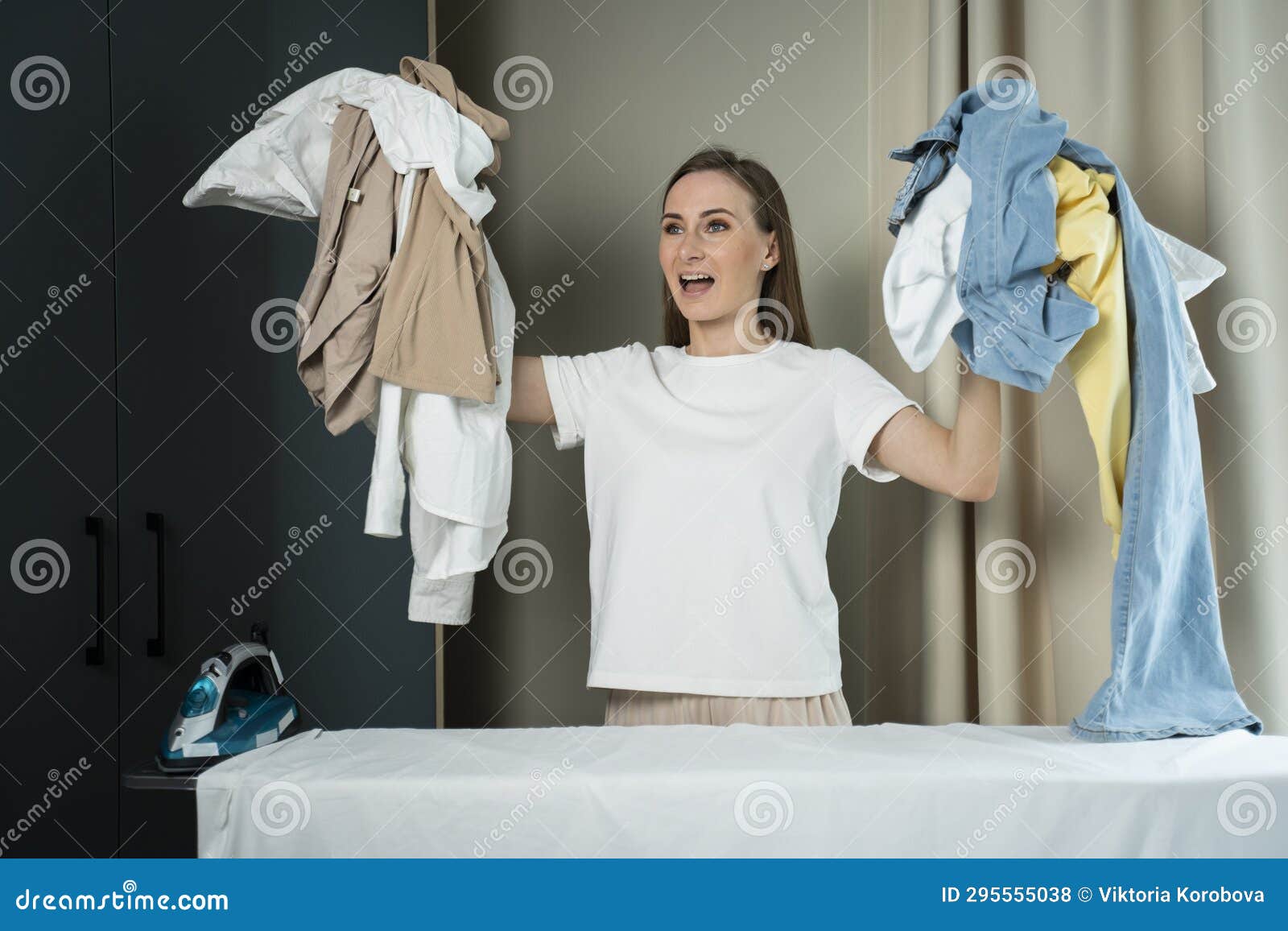 Upset Woman Throws Clothes Around the Room Not Coping with Ironing ...
