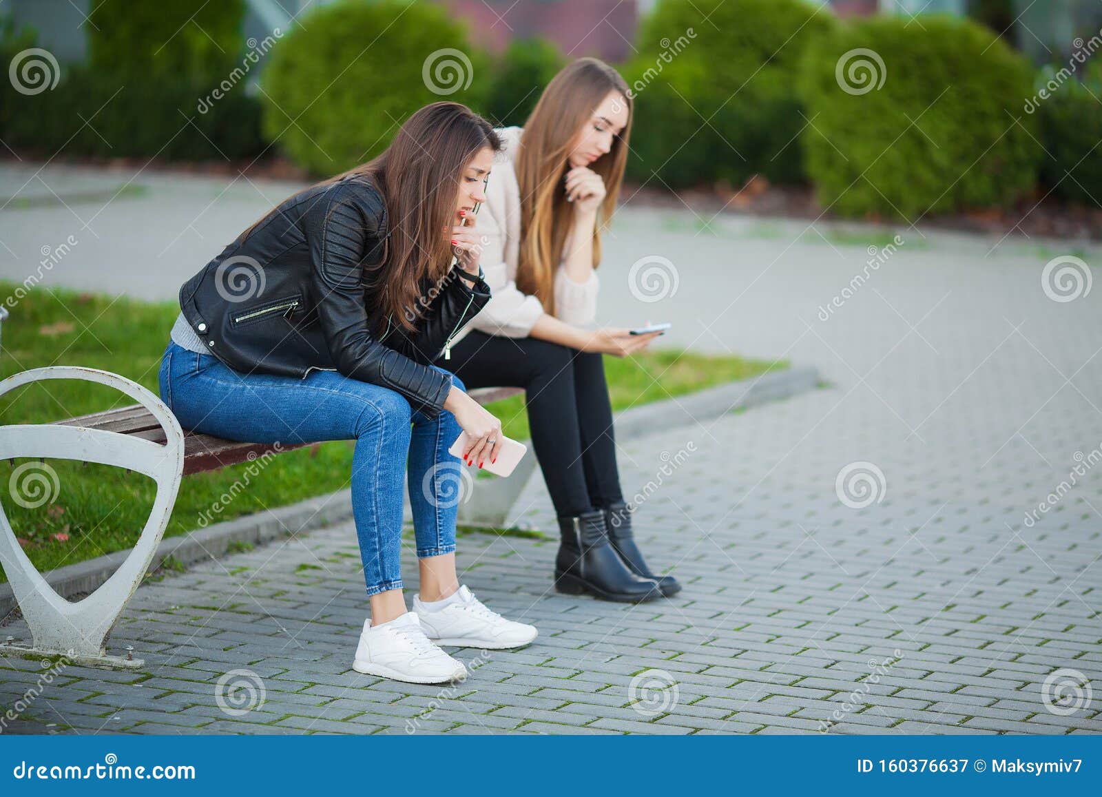 Upset Women with Problems Sitting on a Bench. Stock Image - Image of ...
