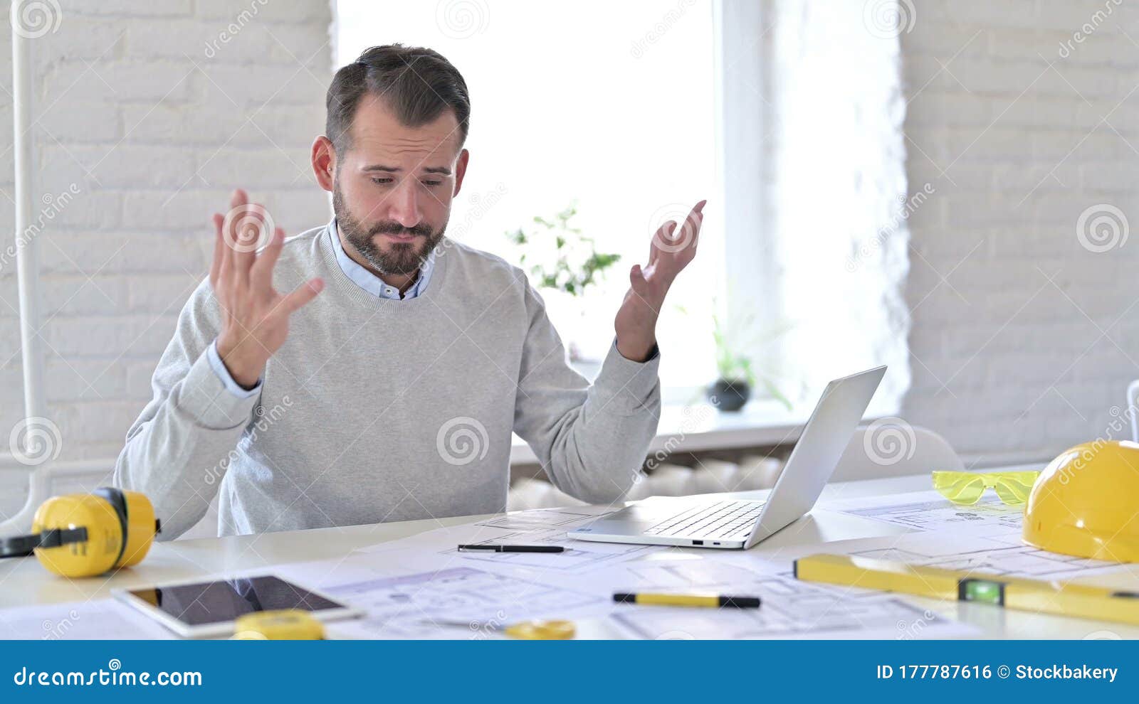 Upset Young Architect Reading To Failure at Work, Disappointment Stock ...