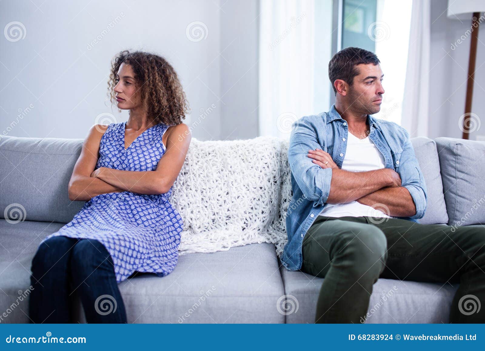 Upset Young Couple Ignoring Each Other Stock Photo - Image of indoors ...
