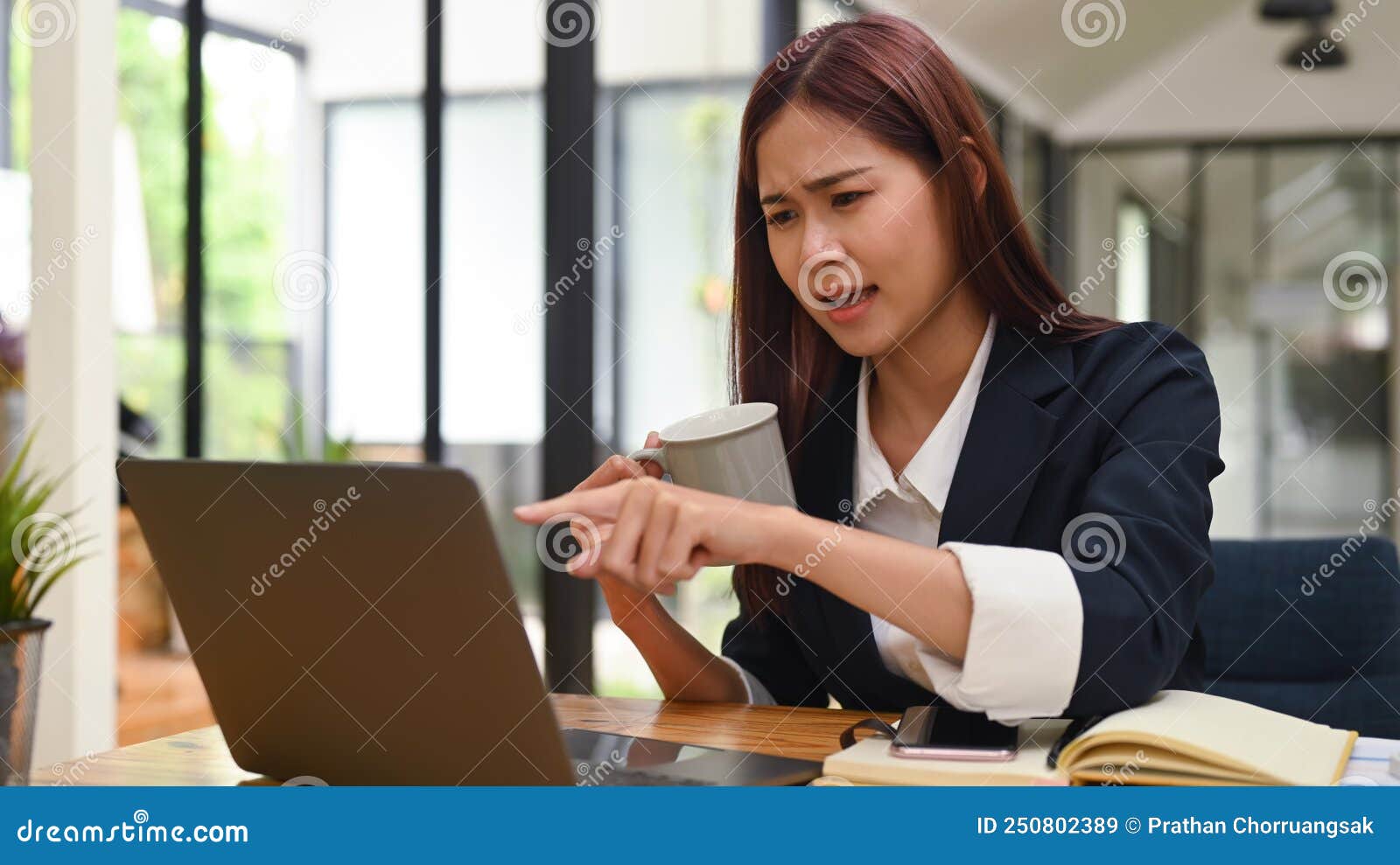 Upset Young Female Office Worker Having Problems with Laptop, Solving ...