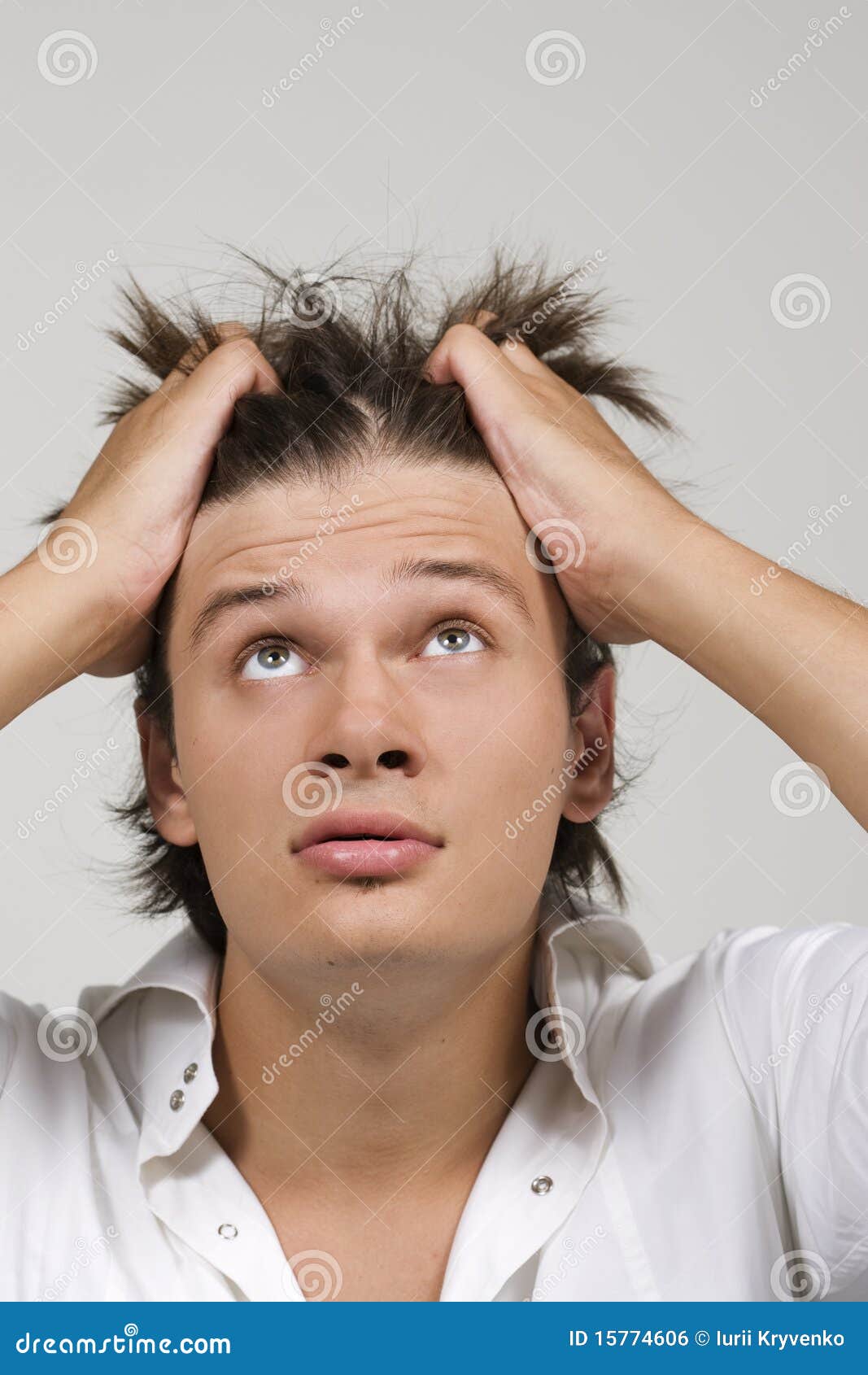 Upset young man stock photo. Image of hands, lens, caucasian - 15774606