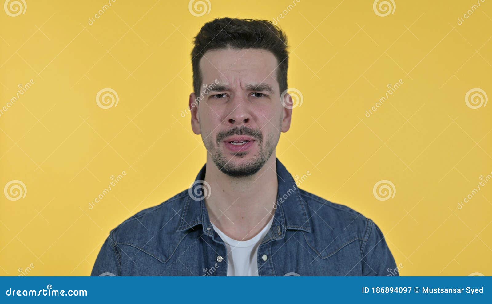 Upset Young Man Crying at Camera, Yellow Background Stock Image - Image ...
