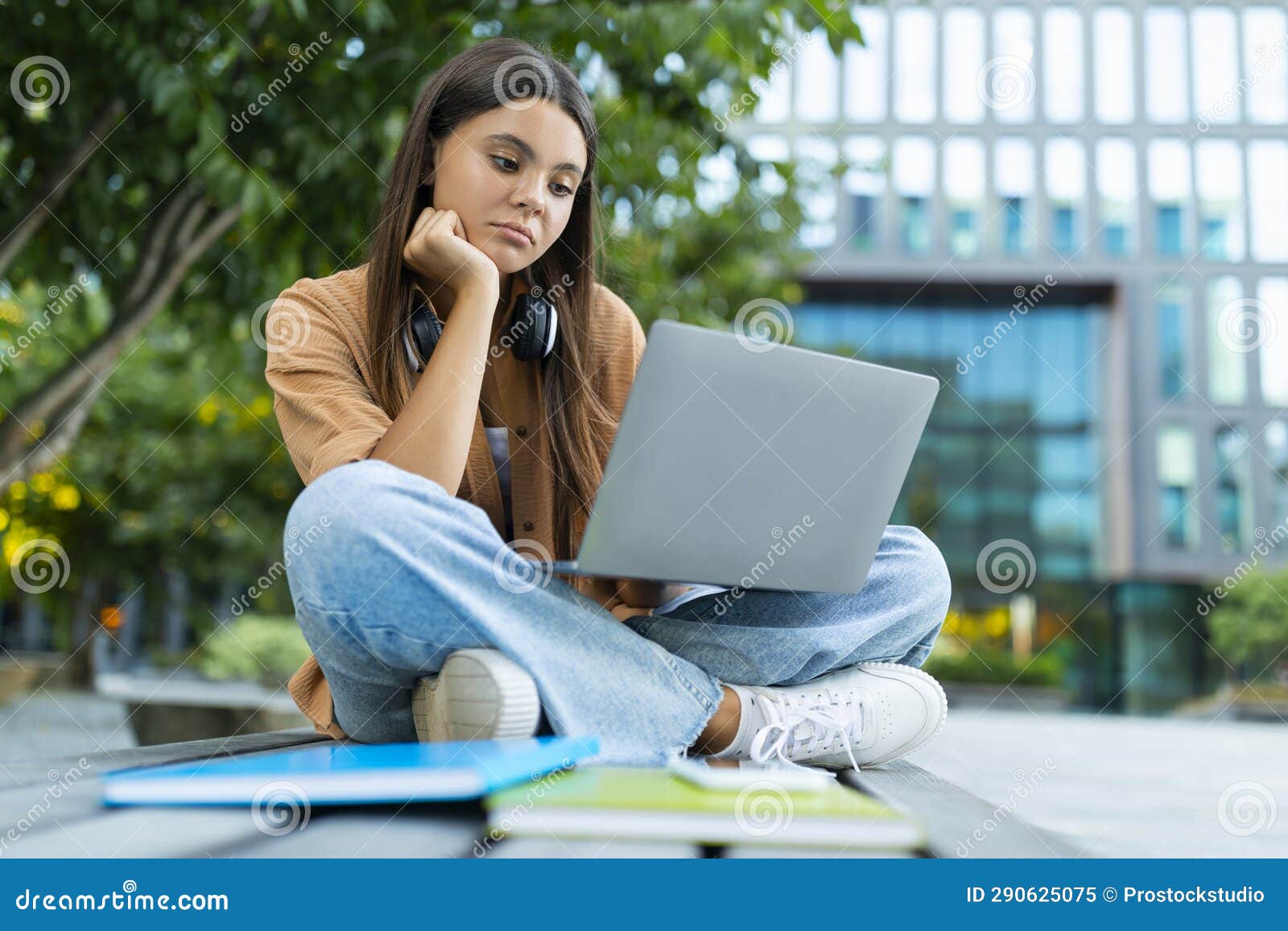 Upset Young Woman University Student Sitting at Park, Using Notebook ...