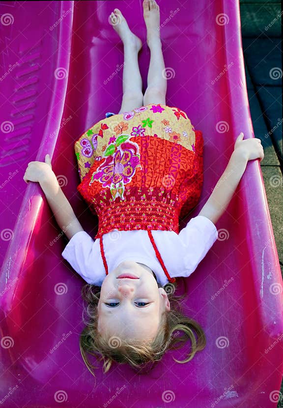 Upside down on the slide stock photo. Image of play, smile - 10103640
