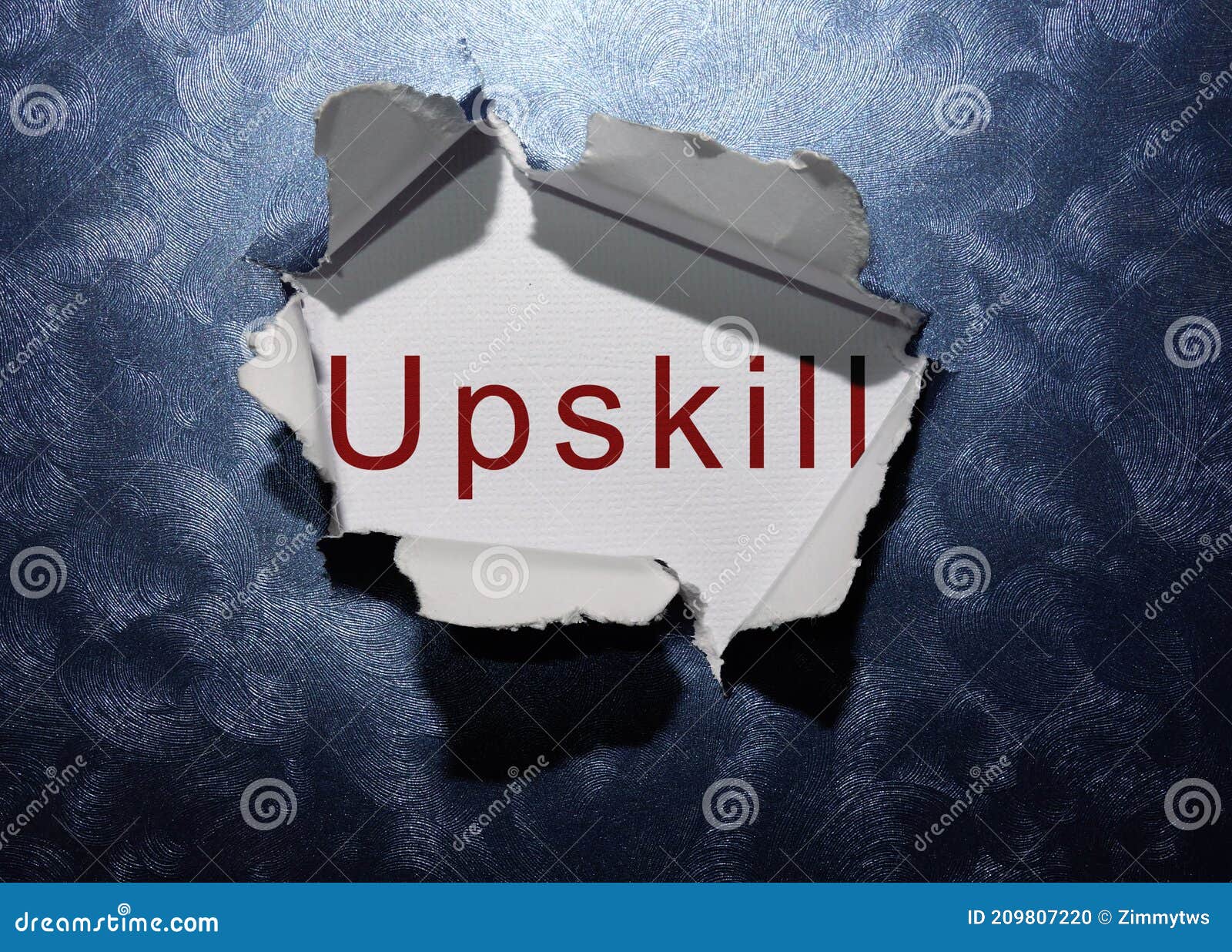 Upskill Text Revealed in Ripped Blue Paper Background Stock Photo ...