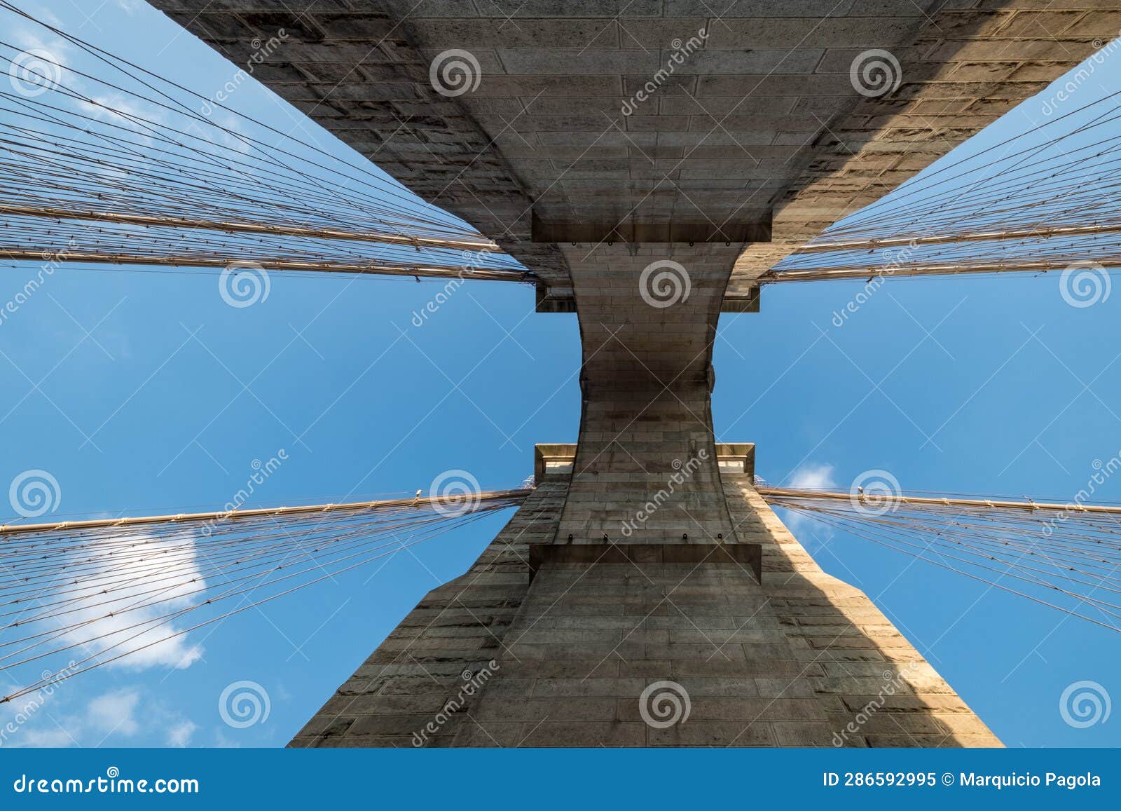 Upward View of the Center Pylons of the Brooklyn Bridge Under a ...