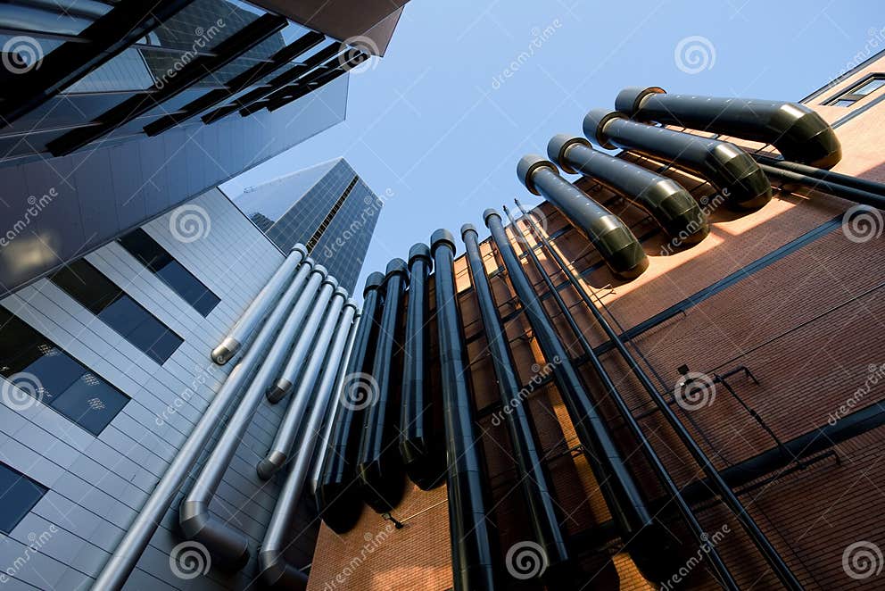 Urban buildings with tubes stock image. Image of structure - 6888509