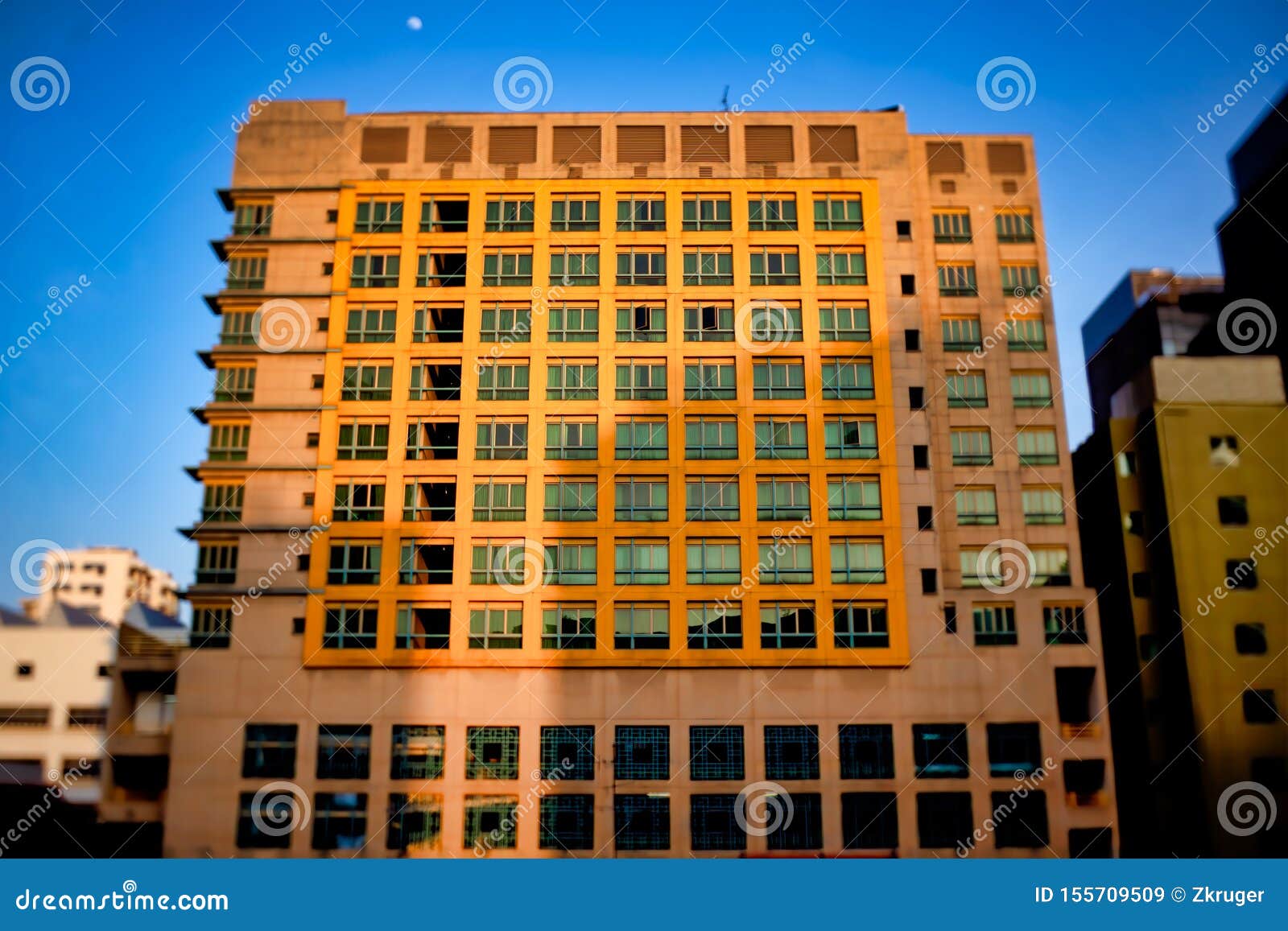 Urban Orange Cityscape Buildings Against Blue Sky Stock Image - Image ...